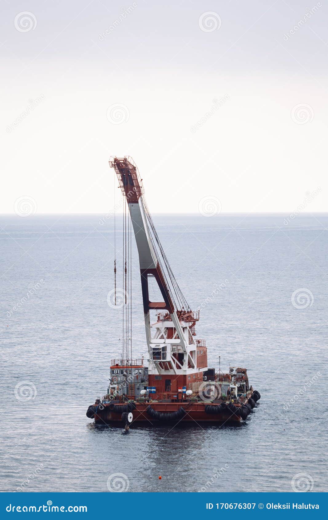 A marine crane is at sea. stock image. Image of ocean - 170676307