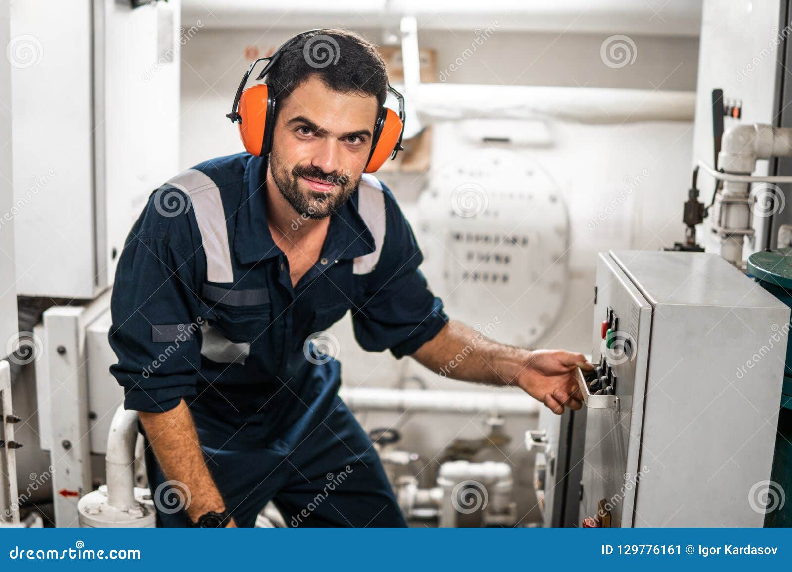 Marine Engineer Officer Working in Engine Room Stock Image - Image of ...