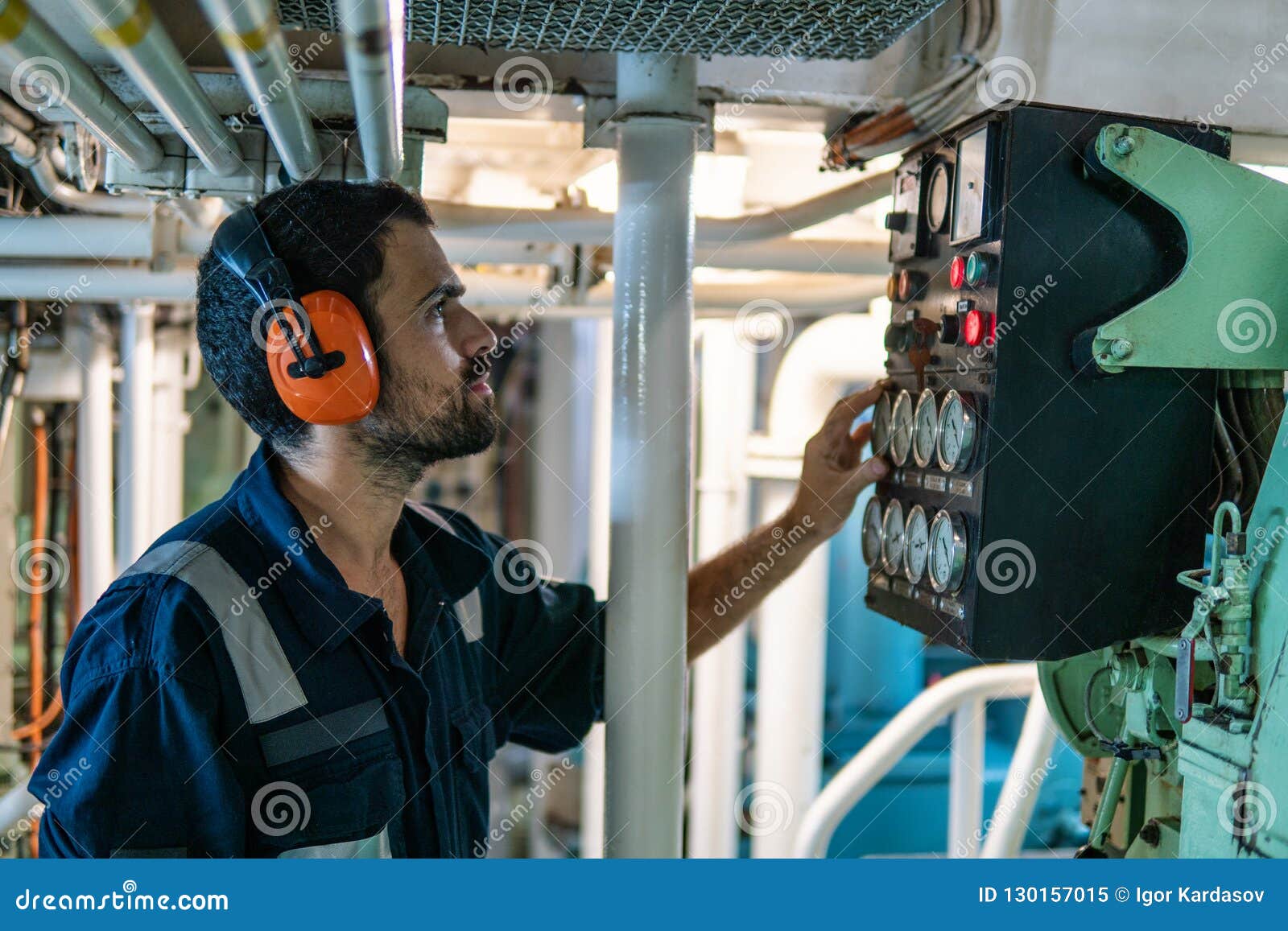 Marine Engineer Officer Working in Engine Room Stock Image - Image of ...