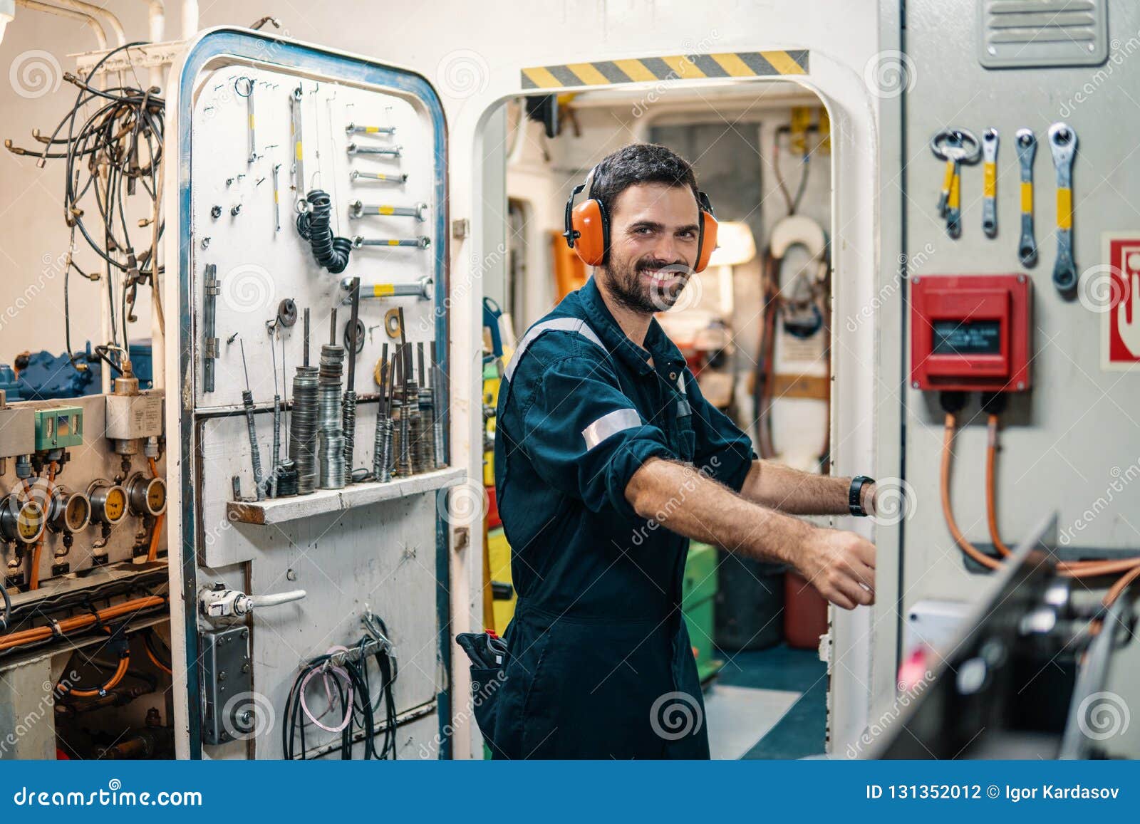 Marine Engineer Officer Working in Engine Room Stock Photo - Image of ...