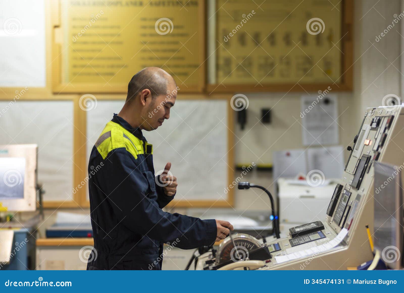 The Marine Engineer Officer Stands at the Main Engine Control Station ...