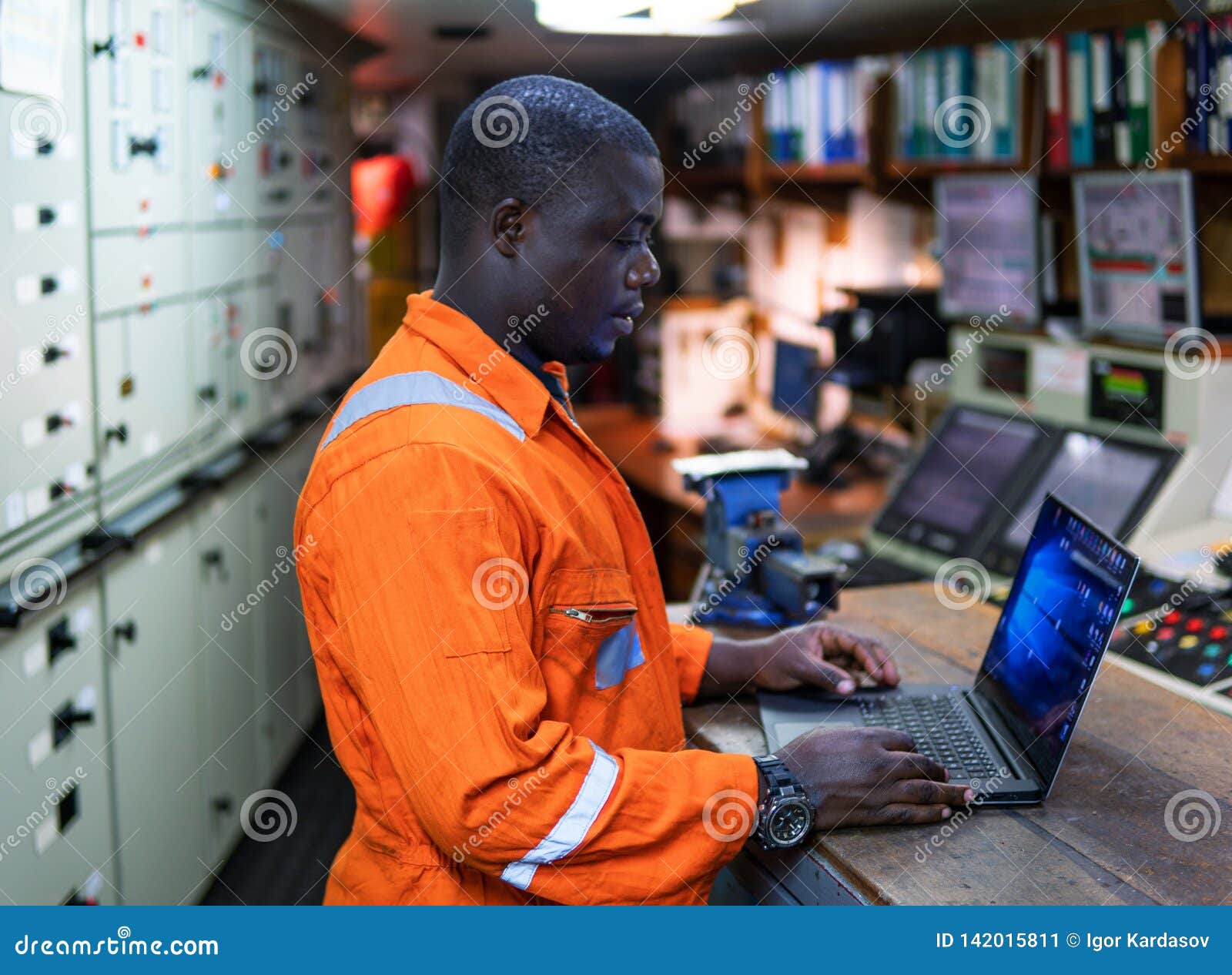 Marine Engineer Officer Working in Engine Room Stock Image - Image of ...