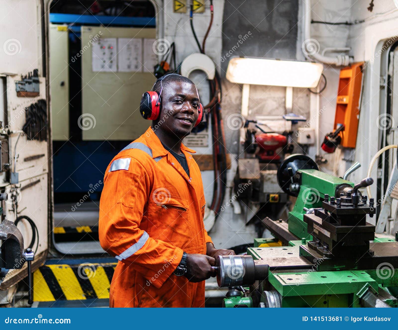 Marine Engineer Officer Working in Engine Room Stock Image - Image of ...