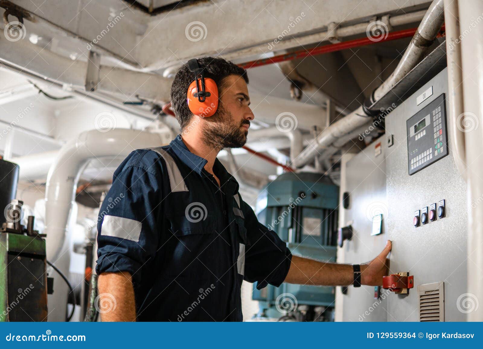 Marine Engineer Officer Working in Engine Room Stock Photo - Image of ...