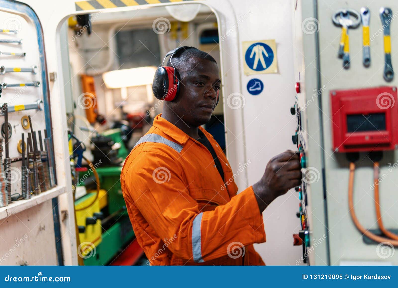 Marine Engineer Officer Working in Engine Room Stock Image - Image of ...