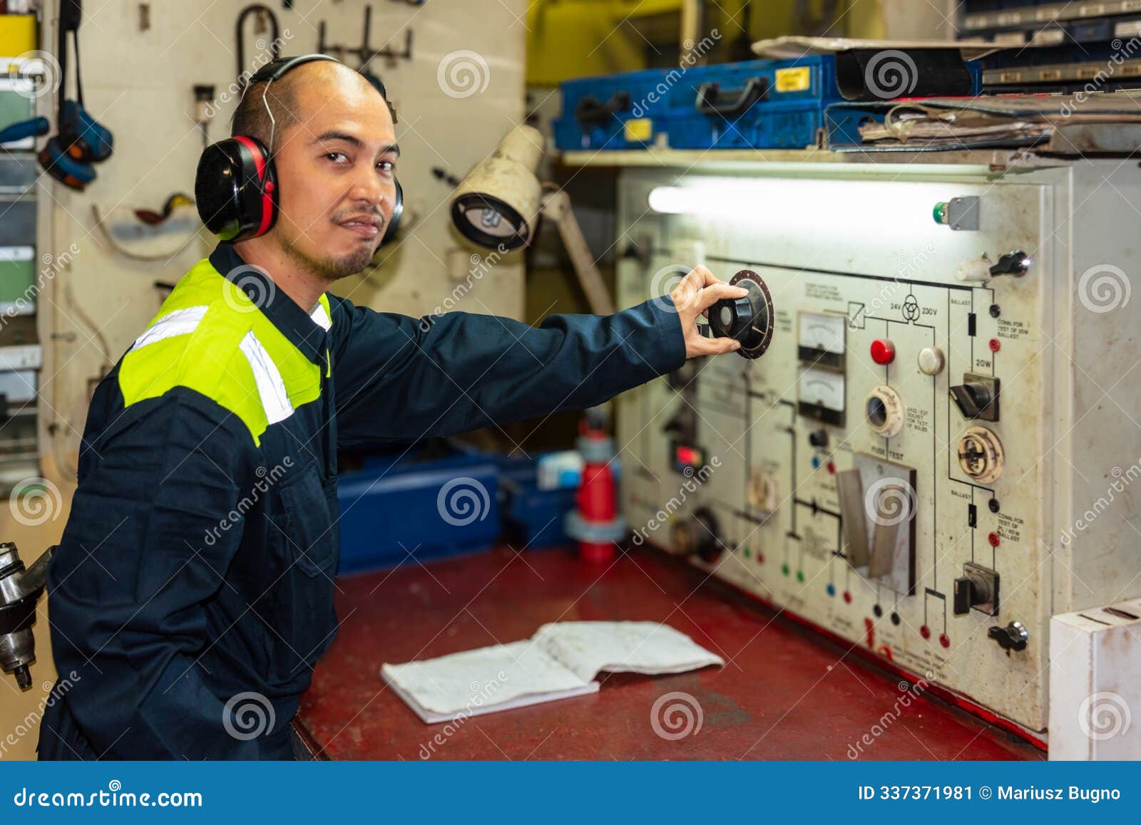 A Marine Engineer Stands at a Testing Station for Electrical and ...