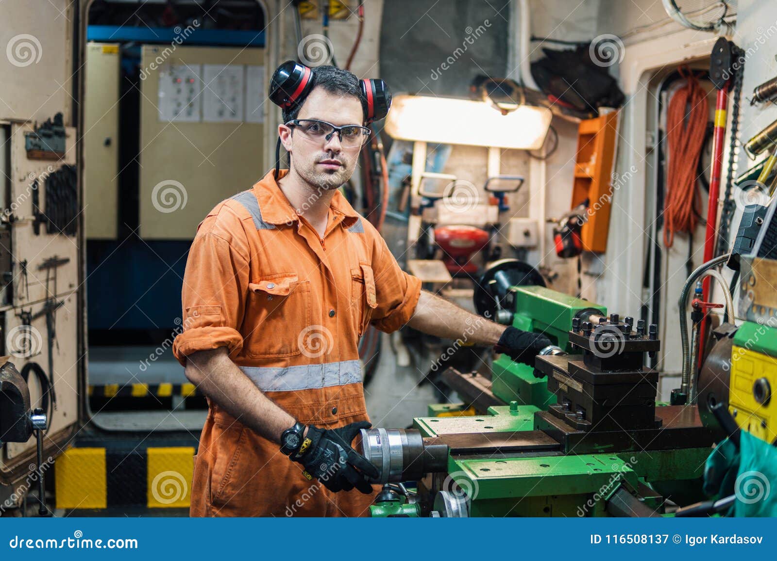 Marine Engineer Working in Ship`s Workshop in Engine Control Room Stock ...