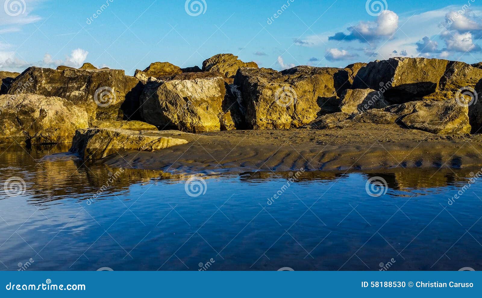 Marine rocks stock photo. Image of cloud, clouds, rock - 58188530