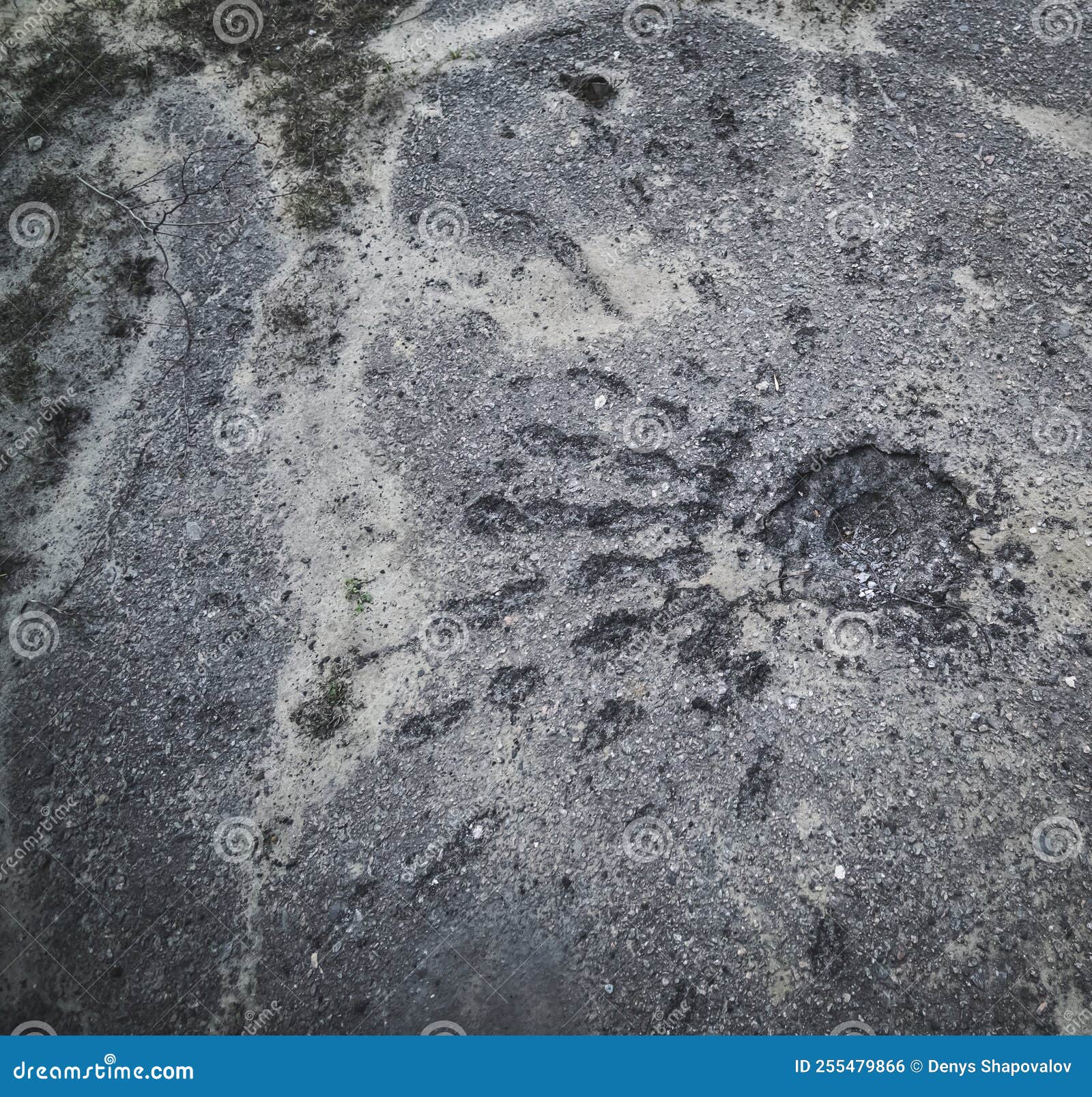 A Mark and a Dent on the Pavement after the Shelling of Rocket ...