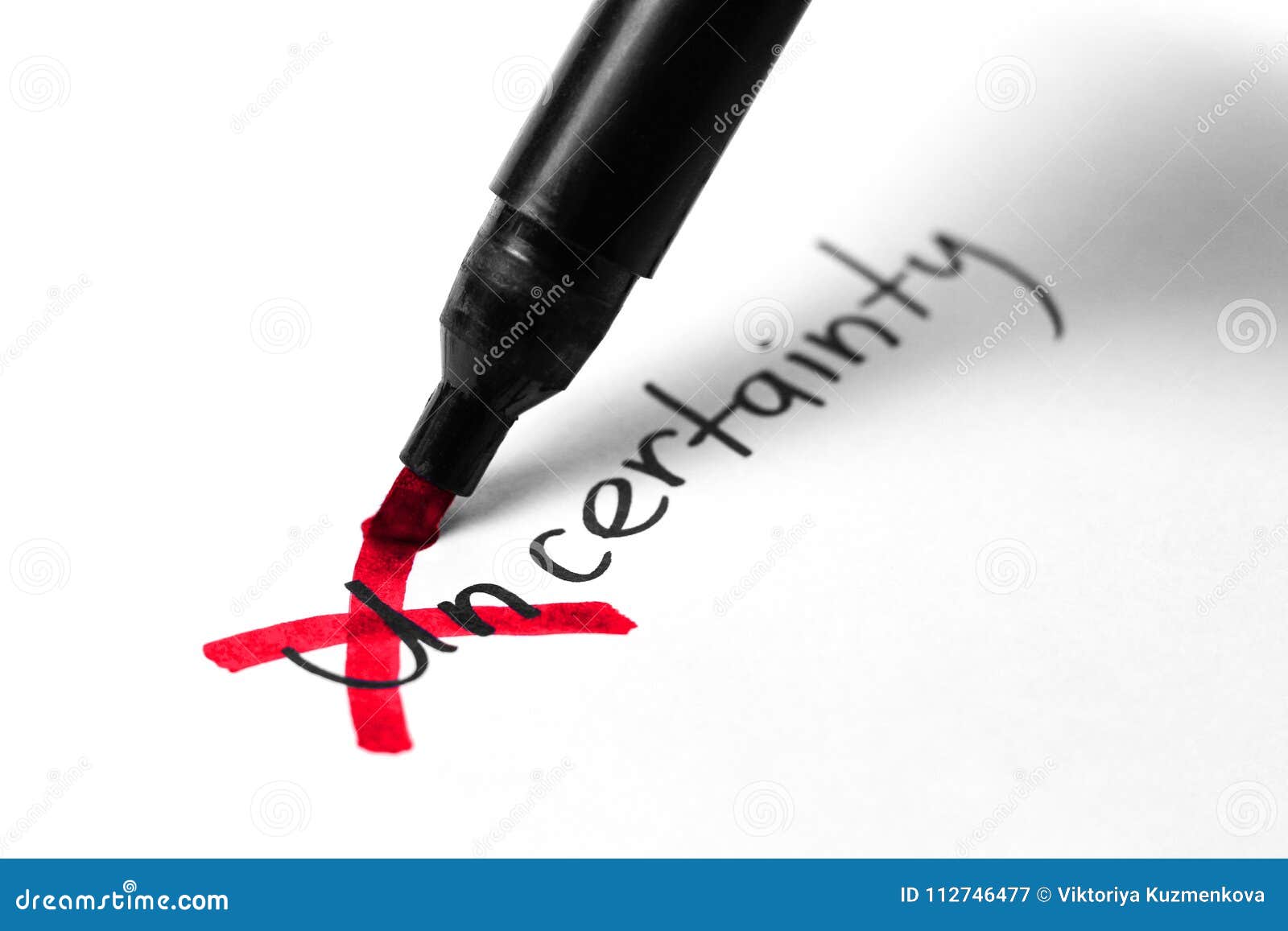 Marker Crossed Out Un in the Word Uncertainty. Close Up Stock Image ...