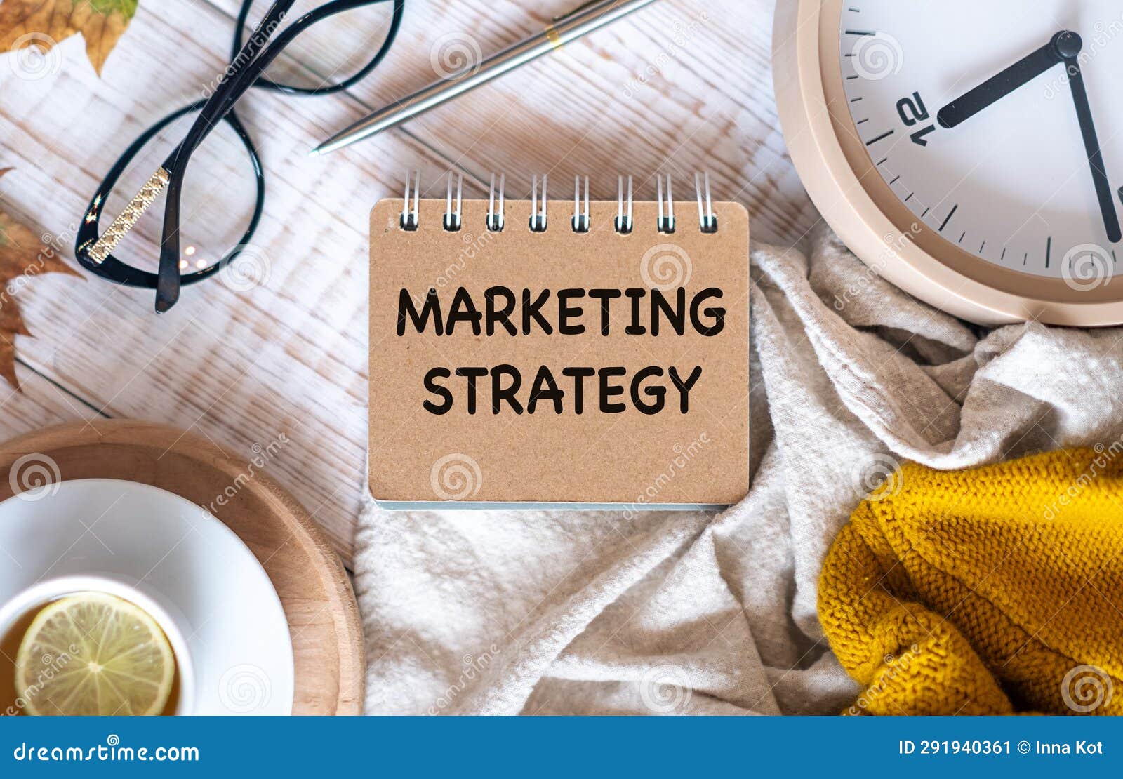 Marketing Strategy Text on a Notebook with Calculator on Diagram ...