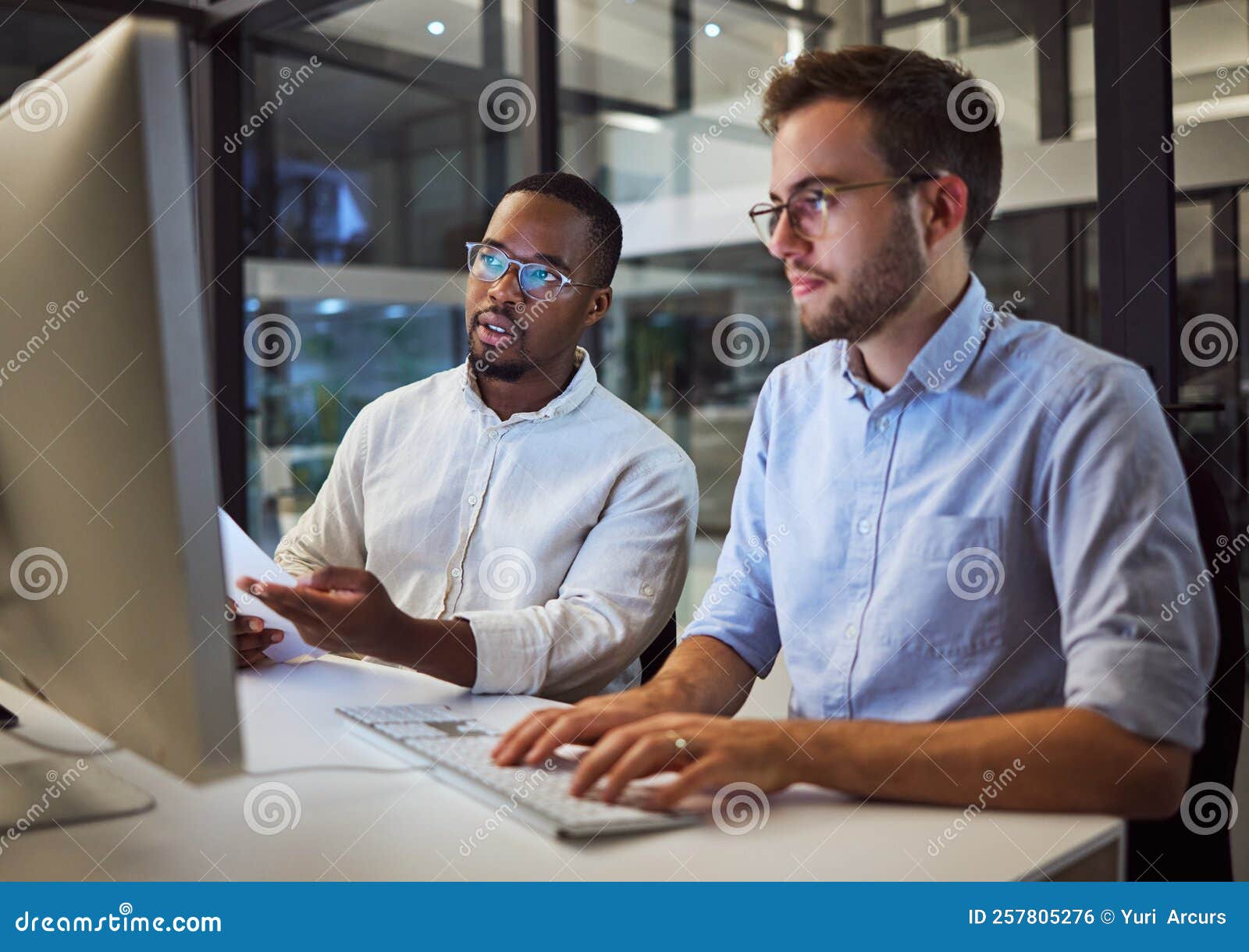 Marketing Team at Night, Working on Digital Advertising Project with ...