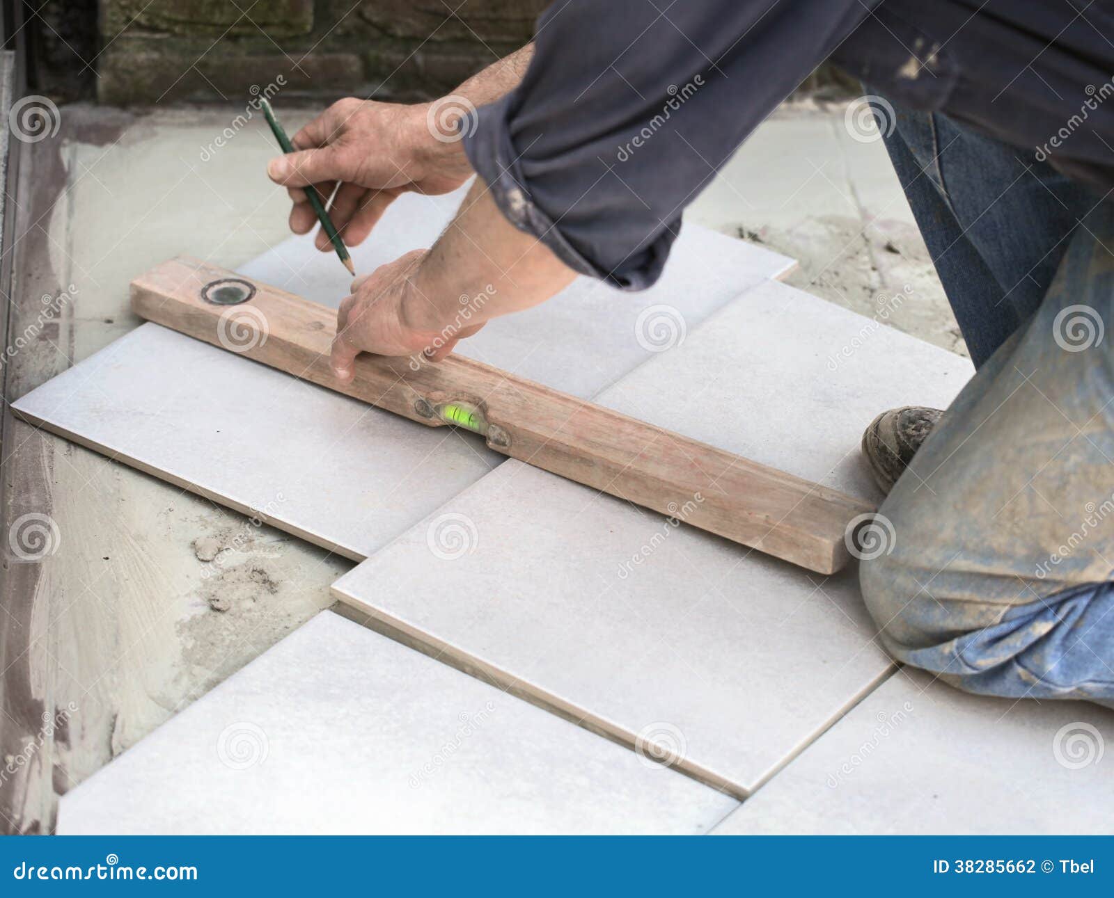 Marking a Floor Tile for Cutting Stock Photo - Image of construction ...