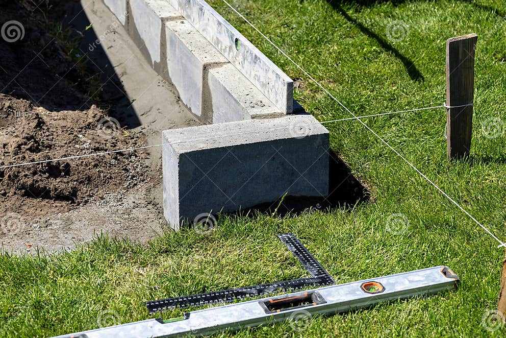 Marking Out Concrete Block Foundations for the Terrace Behind the House ...