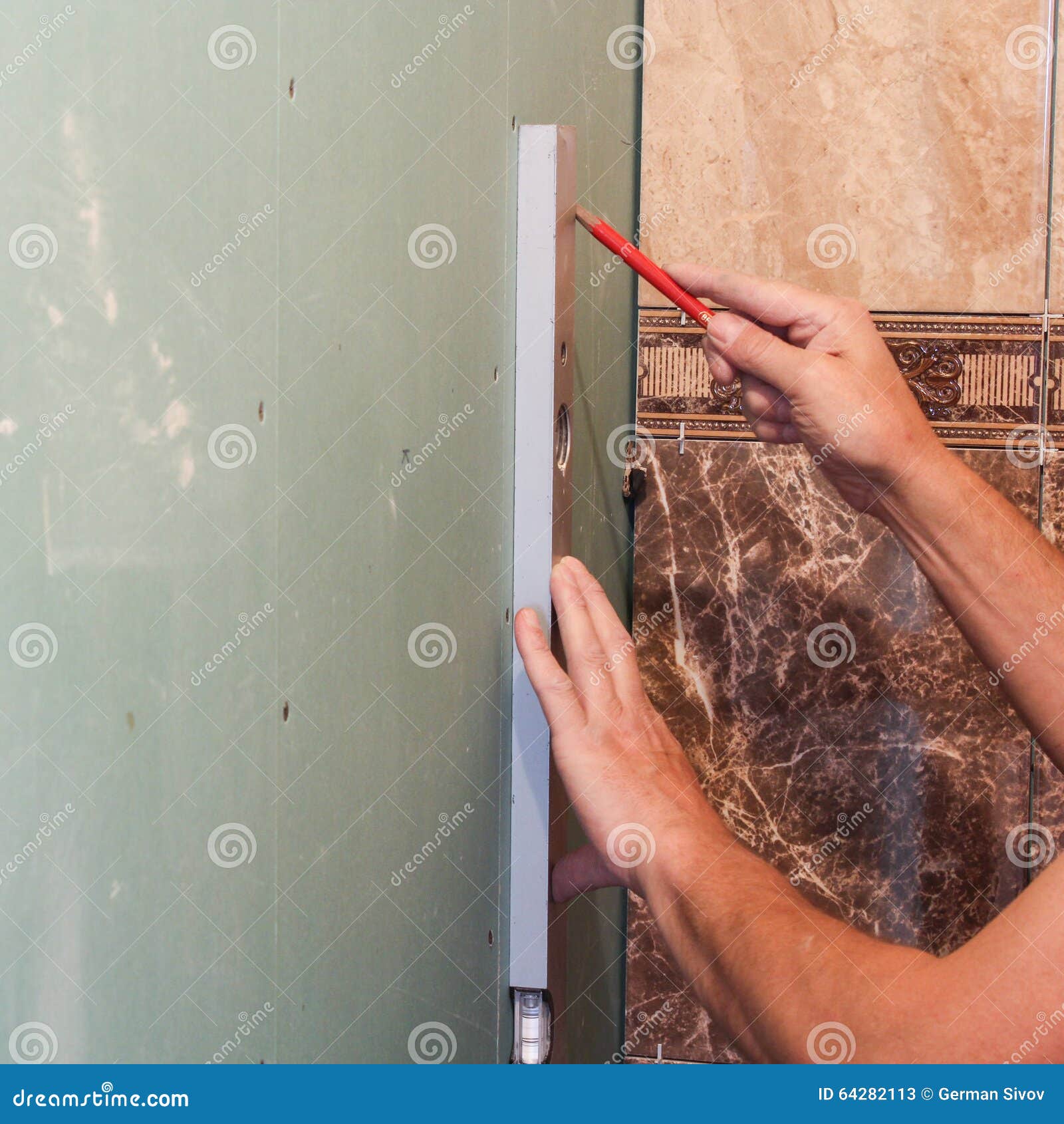 Marking the Wall Using a Level. Stock Image - Image of building, trowel ...