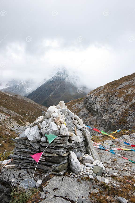 Marnyi Stone Stack with Snow Mountain in Fog Stock Photo - Image of ...