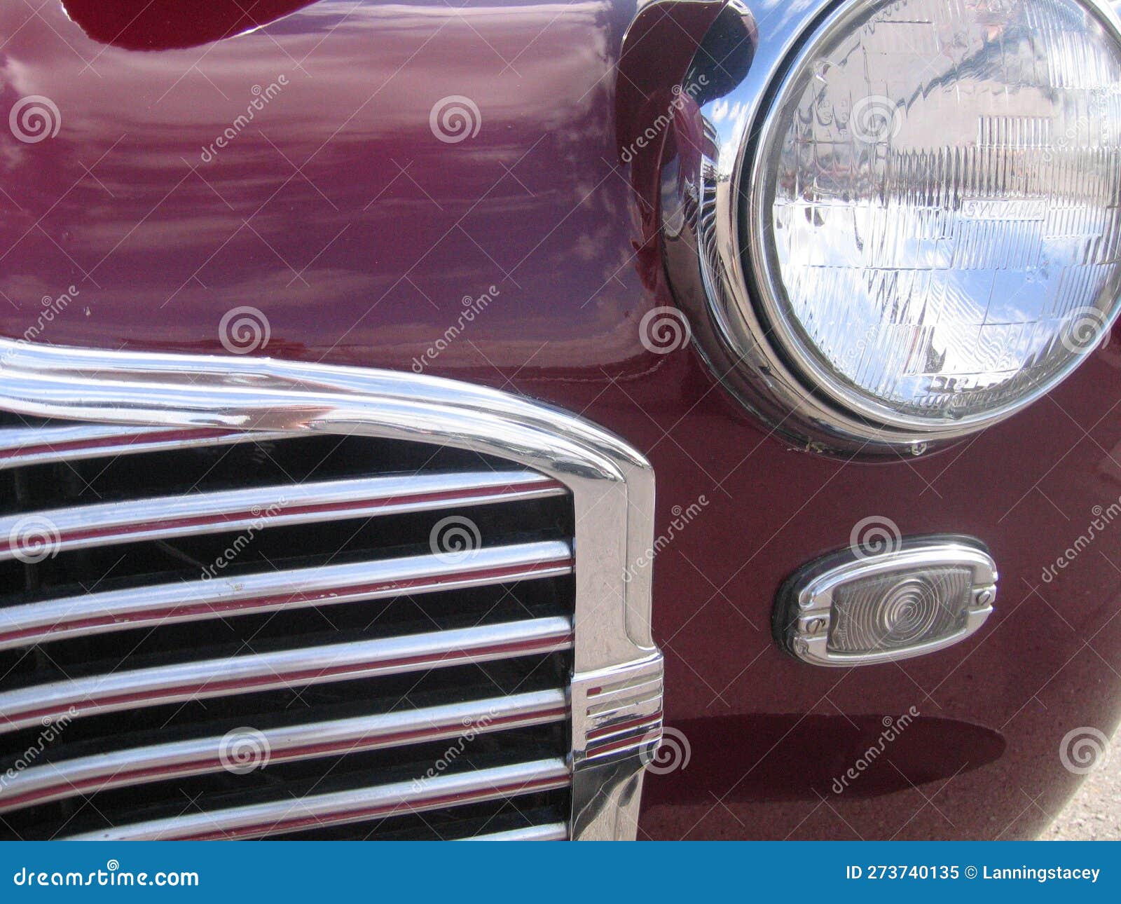 Maroon Classic Car Single Headlight and Partial Grill Stock Image ...
