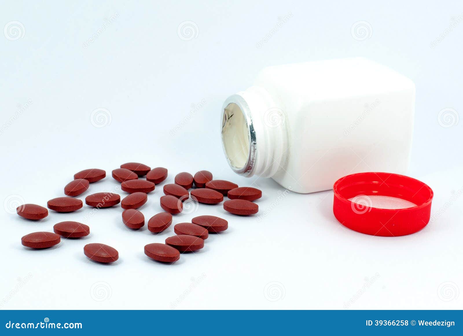 Maroon Pills and Pill Bottle Red Cap Stock Photo - Image of medicine ...