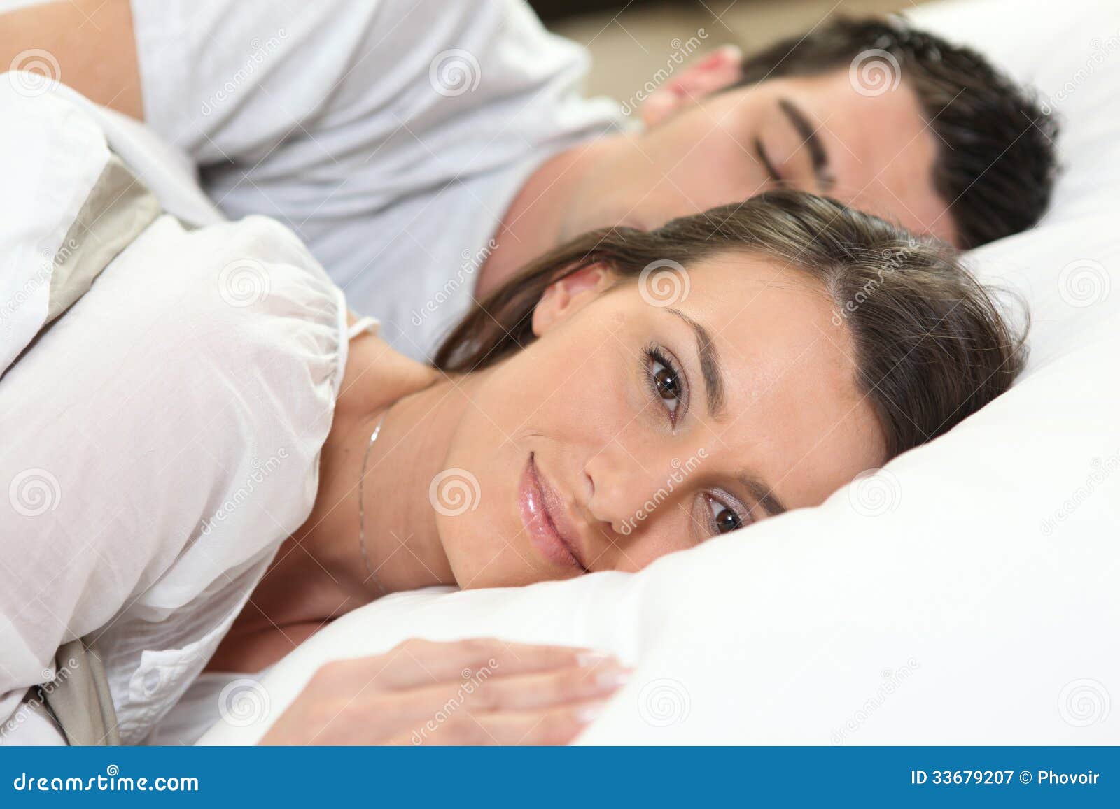 Married couple in bed stock image. Image of cushion, rest - 33679207