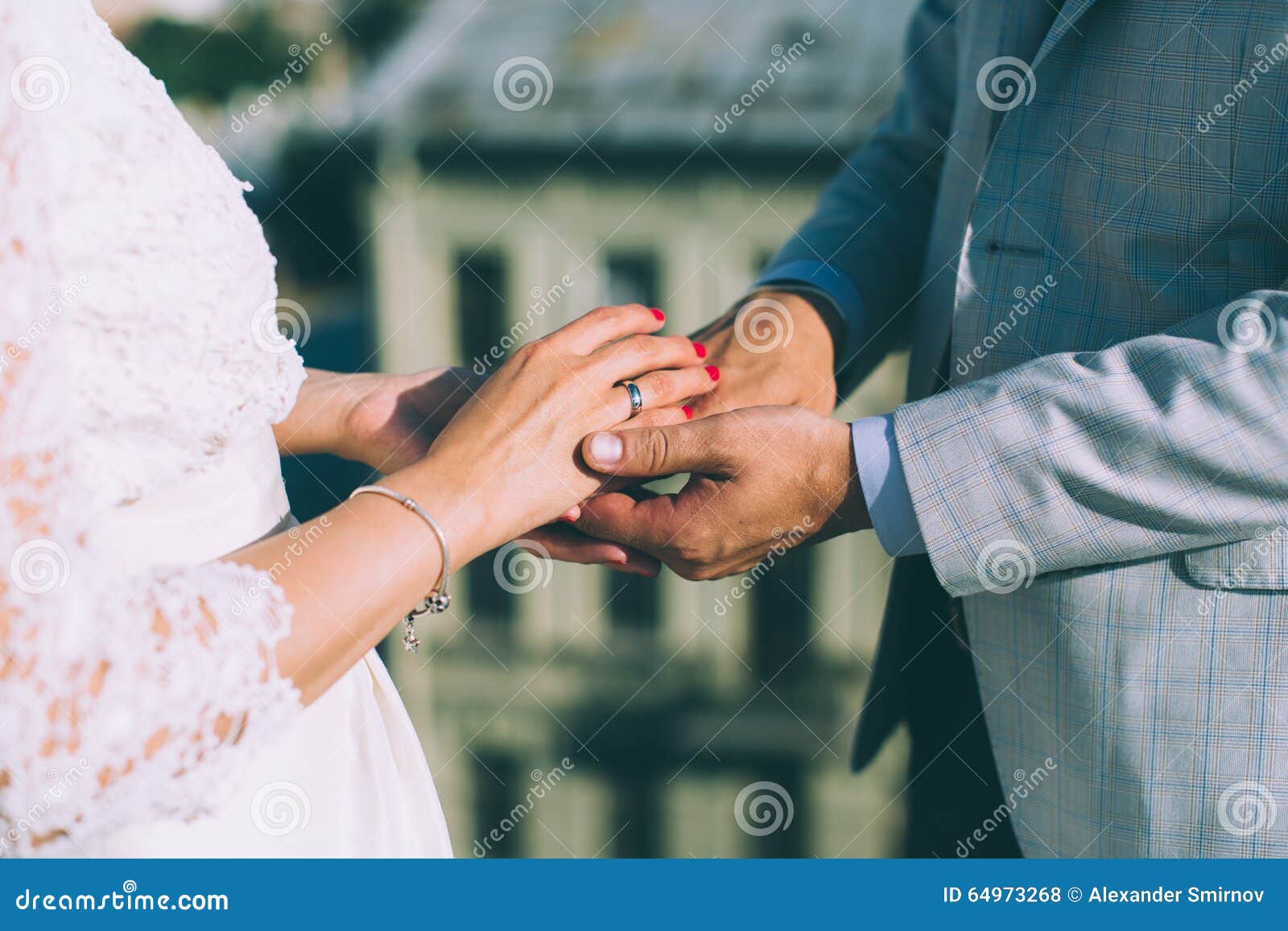 Married Couple Holding Hands Stock Photo - Image of hands, bouquet ...