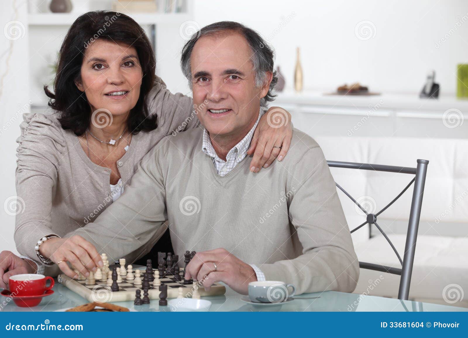 Married Couple Playing Chess Stock Photo - Image of pleasure, maturity ...