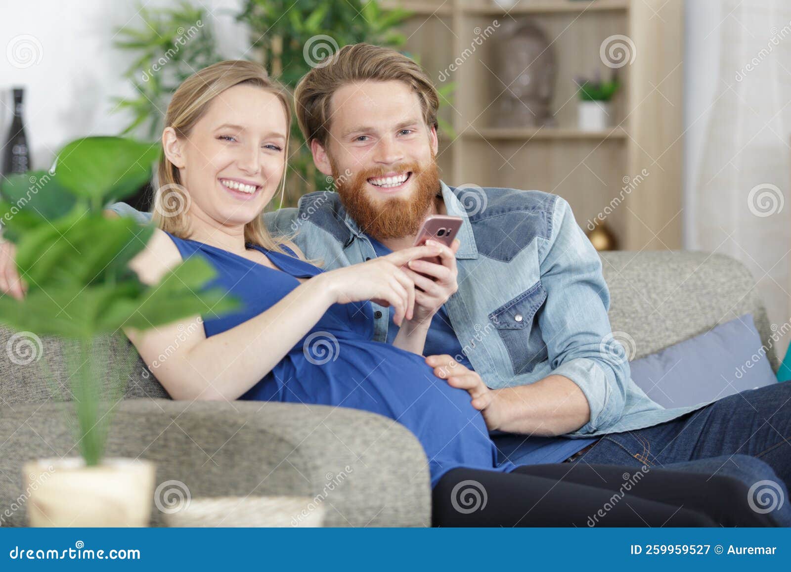Married Couple Using Smartphones Stock Image - Image of busy, young ...