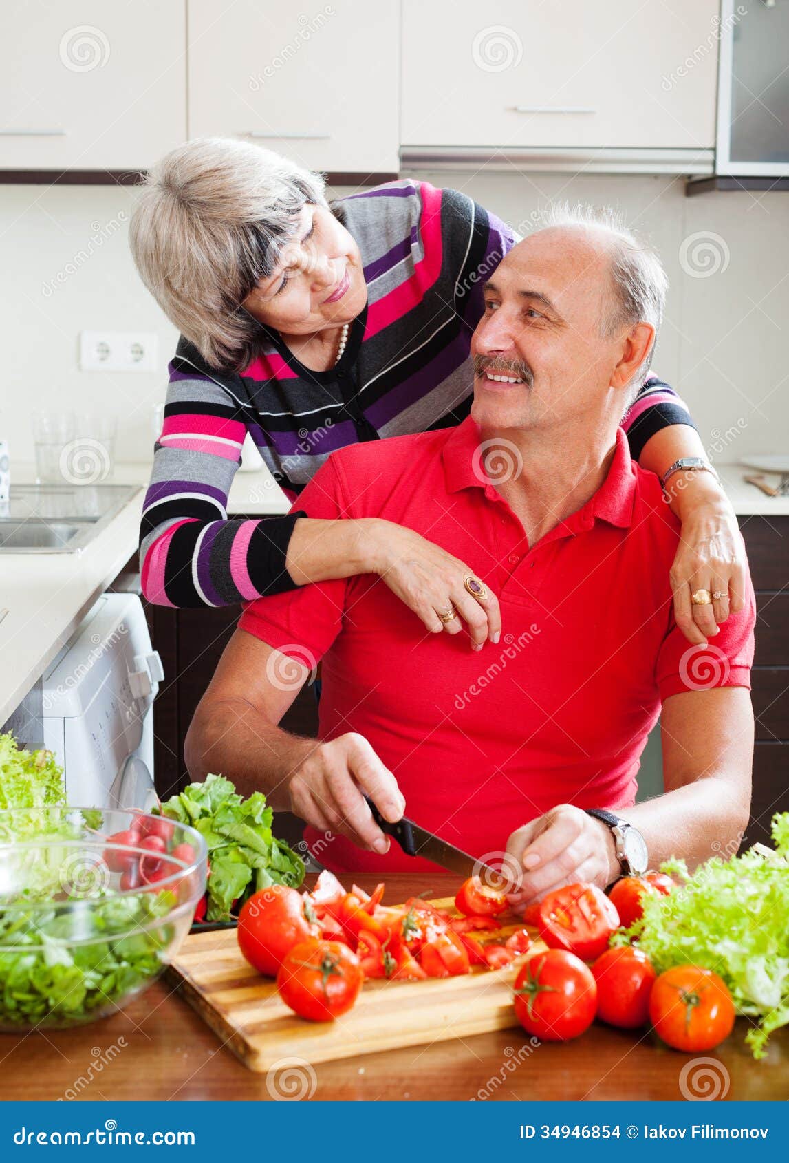 Married Mature Couple Cooking Together Stock Photo - Image of interior ...