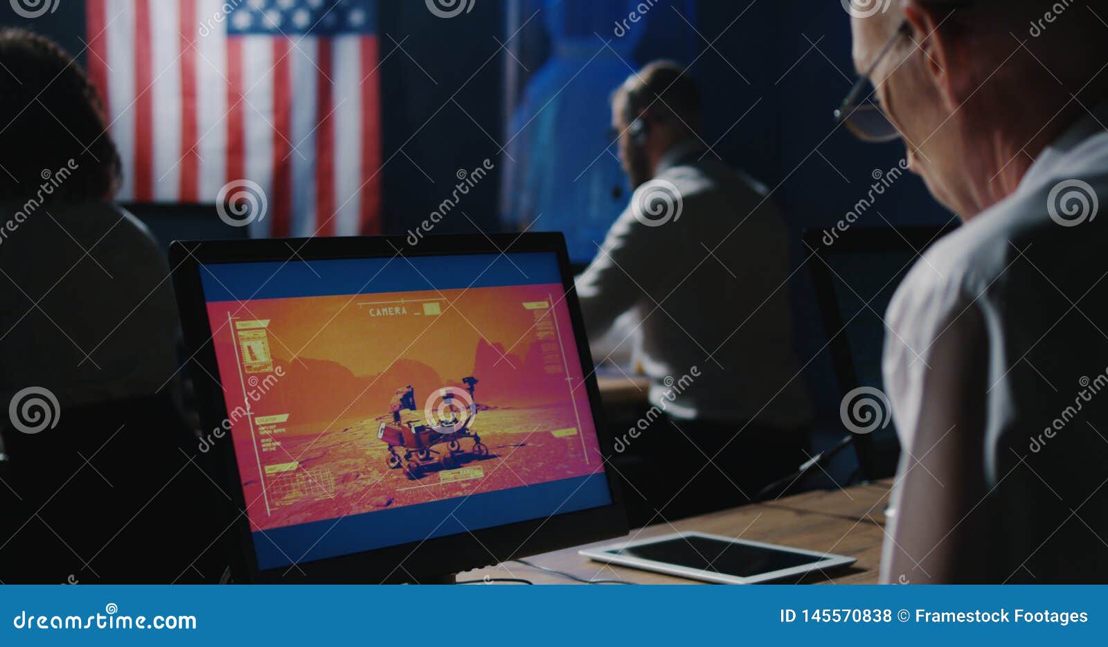 Mars Mission Technicians Working at Their Desk Stock Photo - Image of ...
