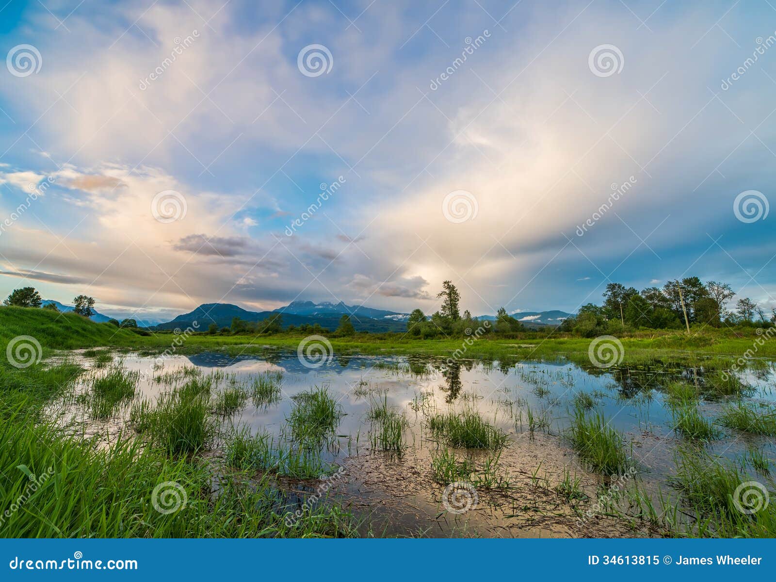 Marsh with Mountain and Amazing Clouds Stock Image - Image of alpine ...