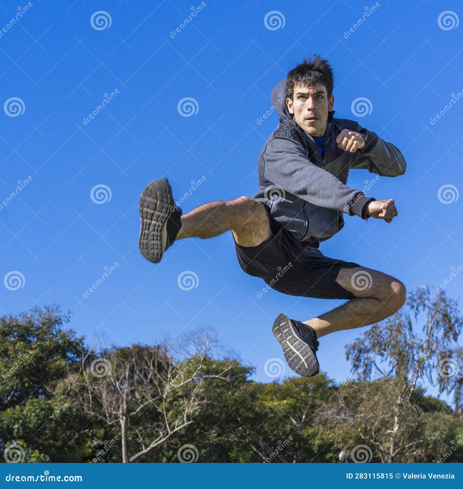Martial Fighter Practicing Flying Kicks Stock Image - Image of action ...
