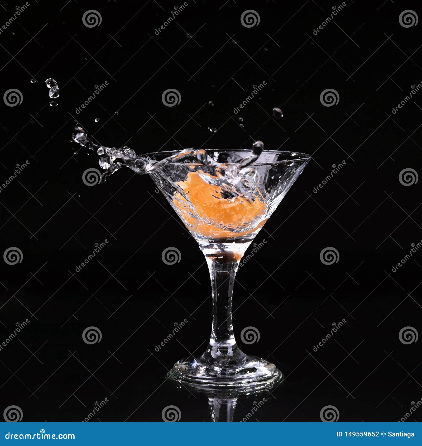 Martini Cocktail Splashing into Glass on Black Stock Photo - Image of ...