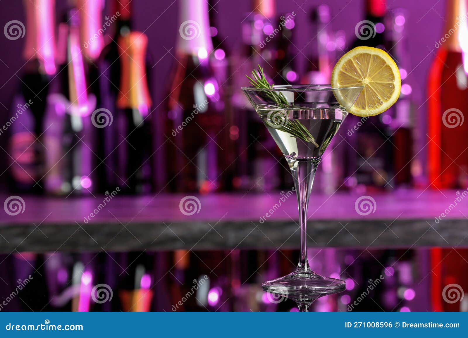 Martini Glass of Refreshing Cocktail and Lemon Slice on Mirror Surface ...