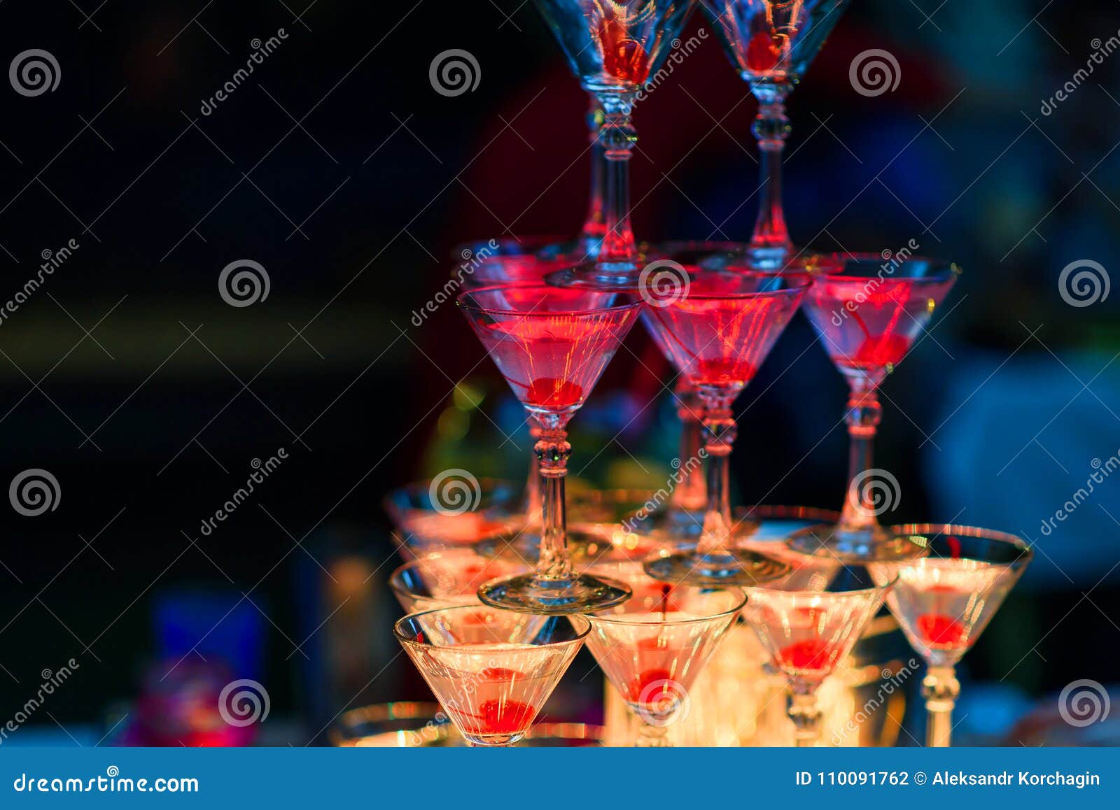 Martini Glasses with Cherries with Red Bright Illumination Stock Photo ...