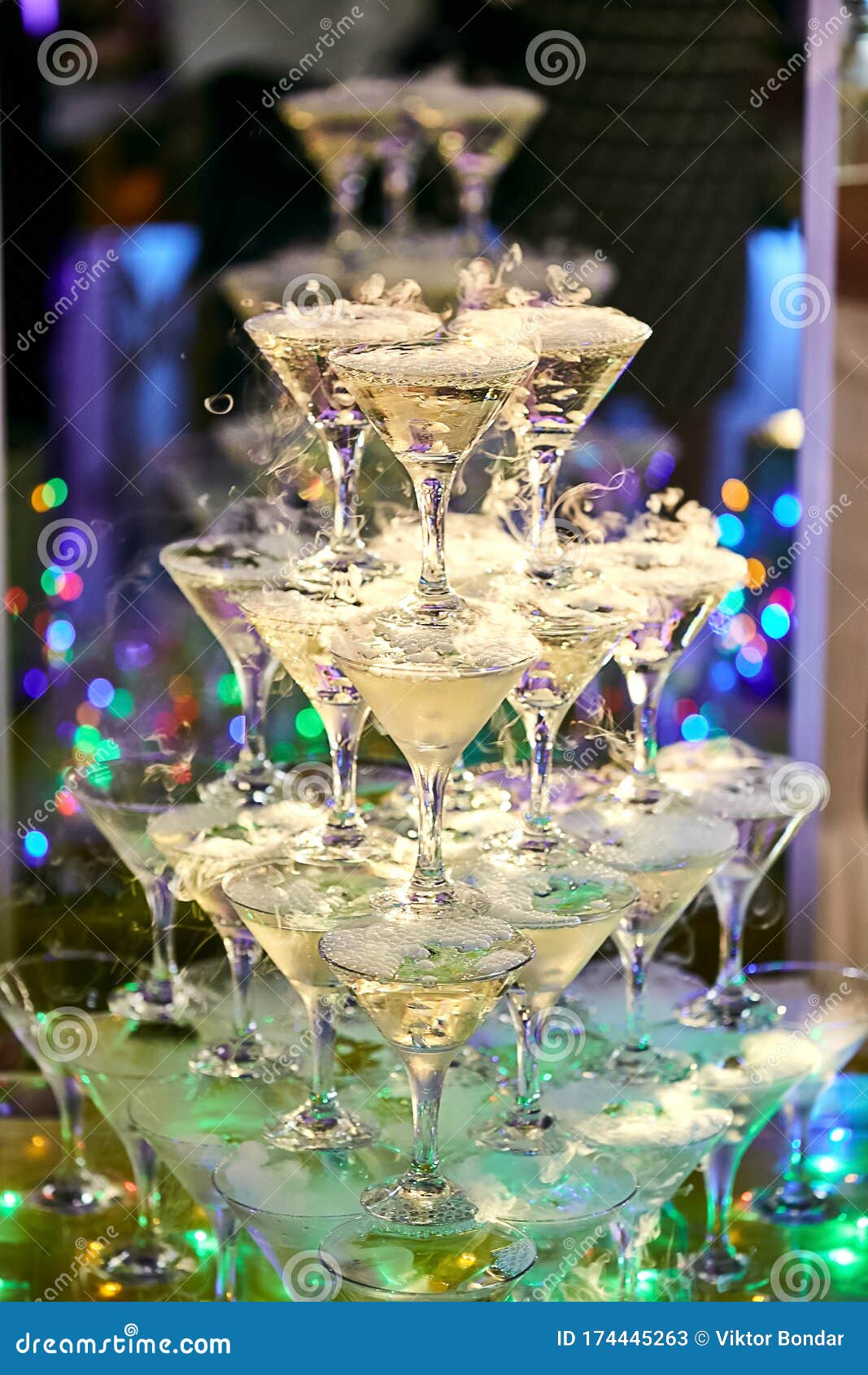 Martini Glasses in the Form of a Cascade or Pyramid Lit Light at the ...