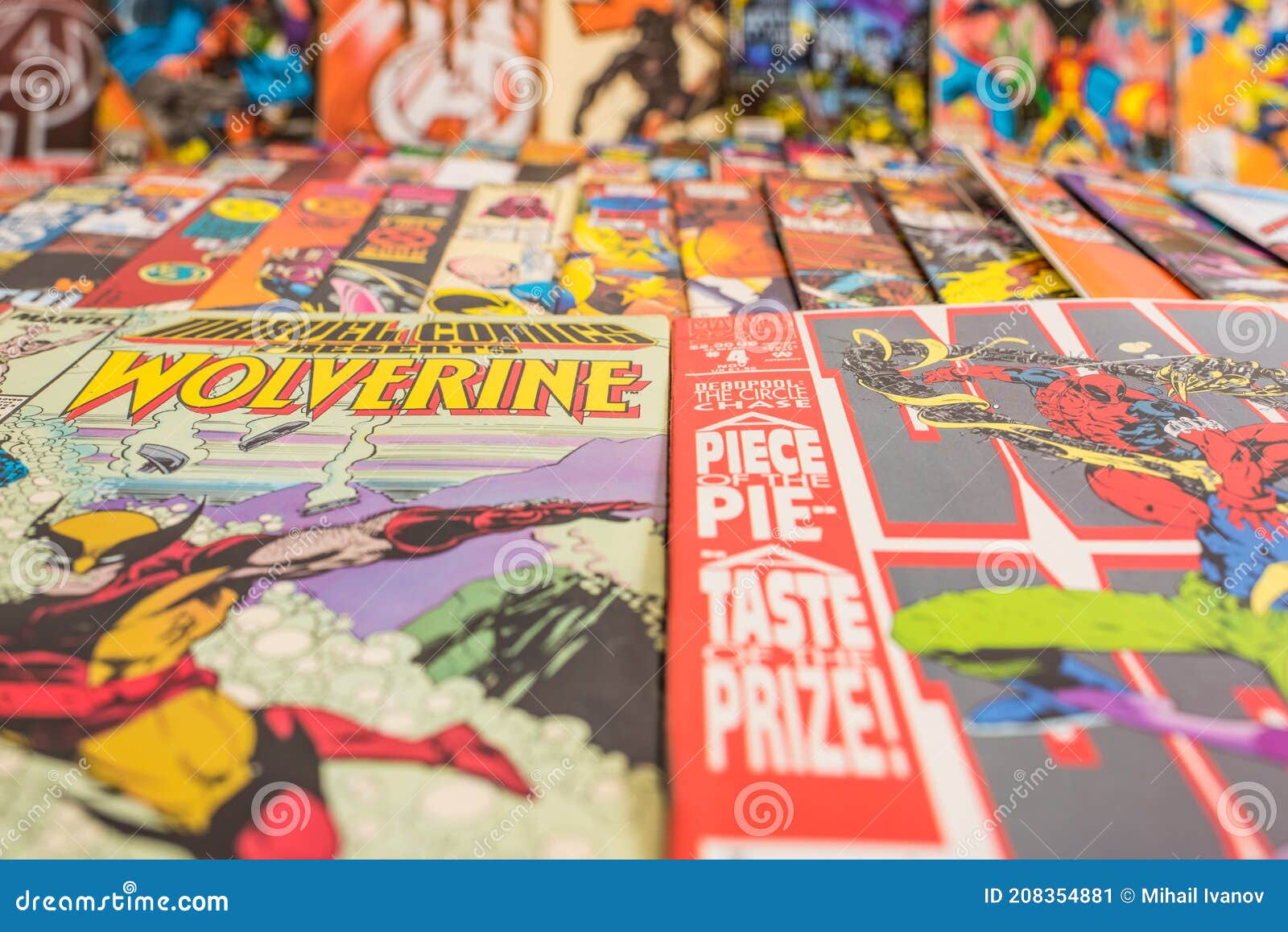 Marvel and DC Comic Book on Display at a Shop with Wolverine and ...