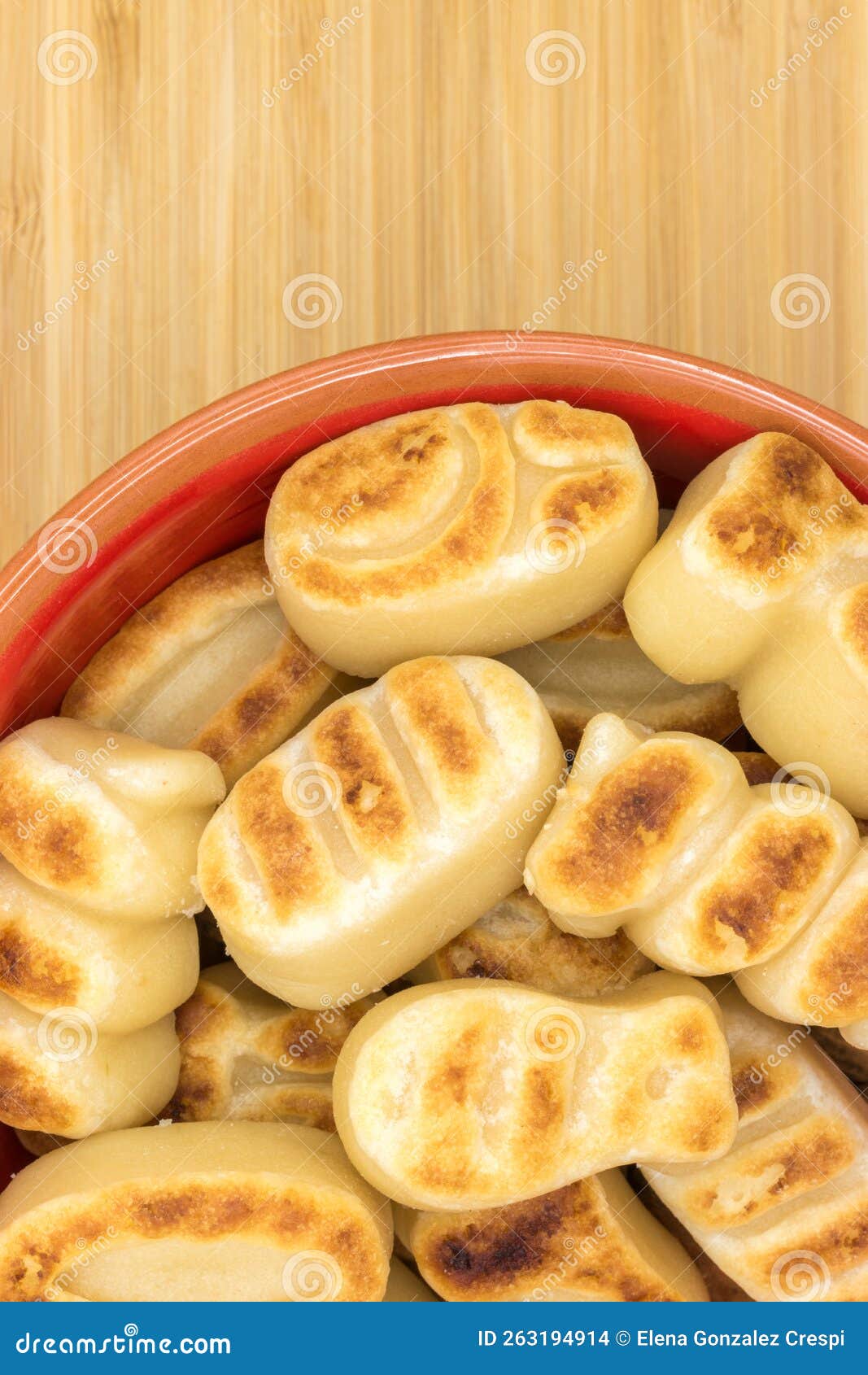 Marzipan Figures in a Ceramic Bowl, on a Wooden Surface . Top View ...