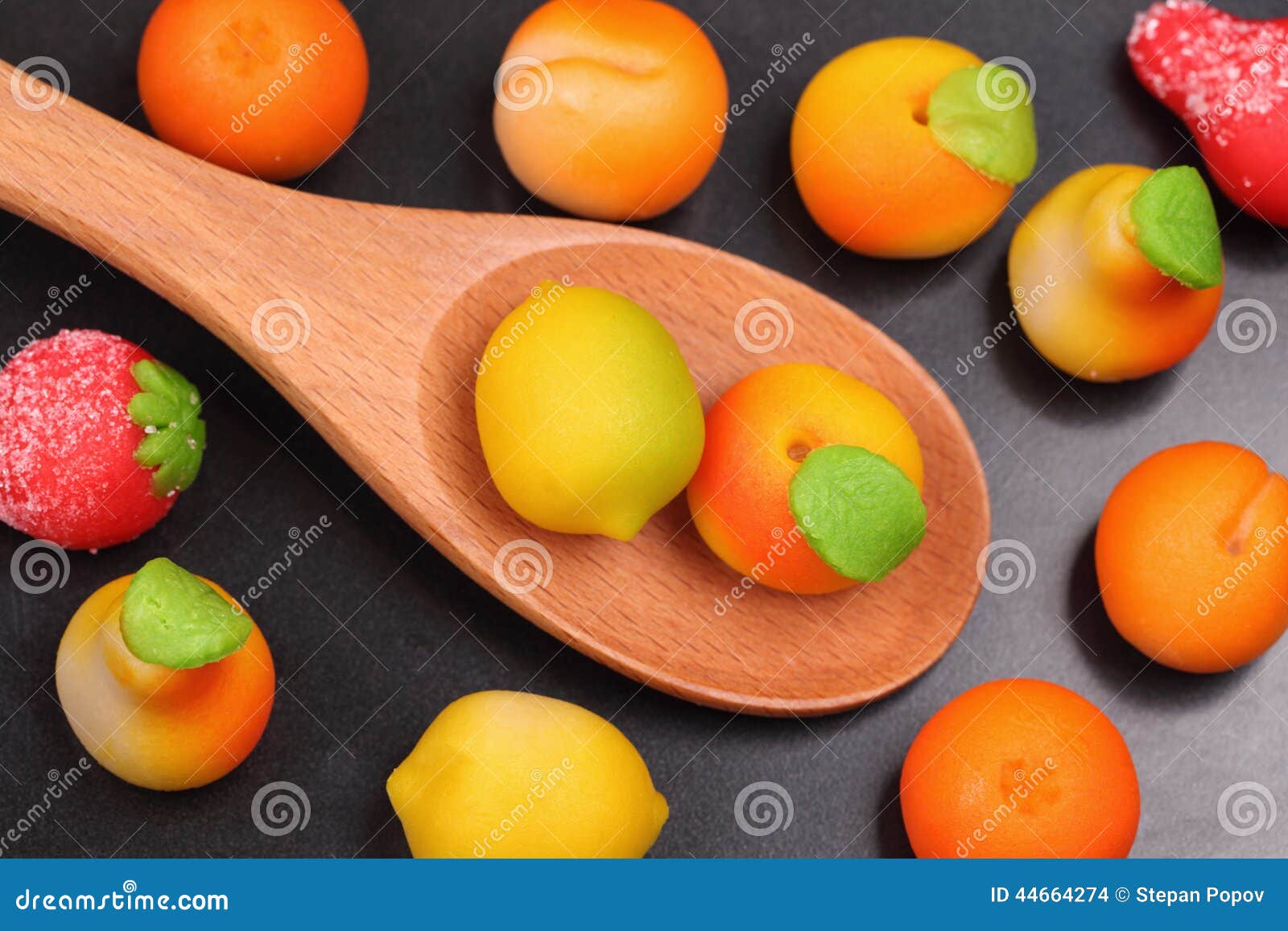 Marzipan Fruit Shapes in a Wooden Spoon Stock Photo - Image of candy ...