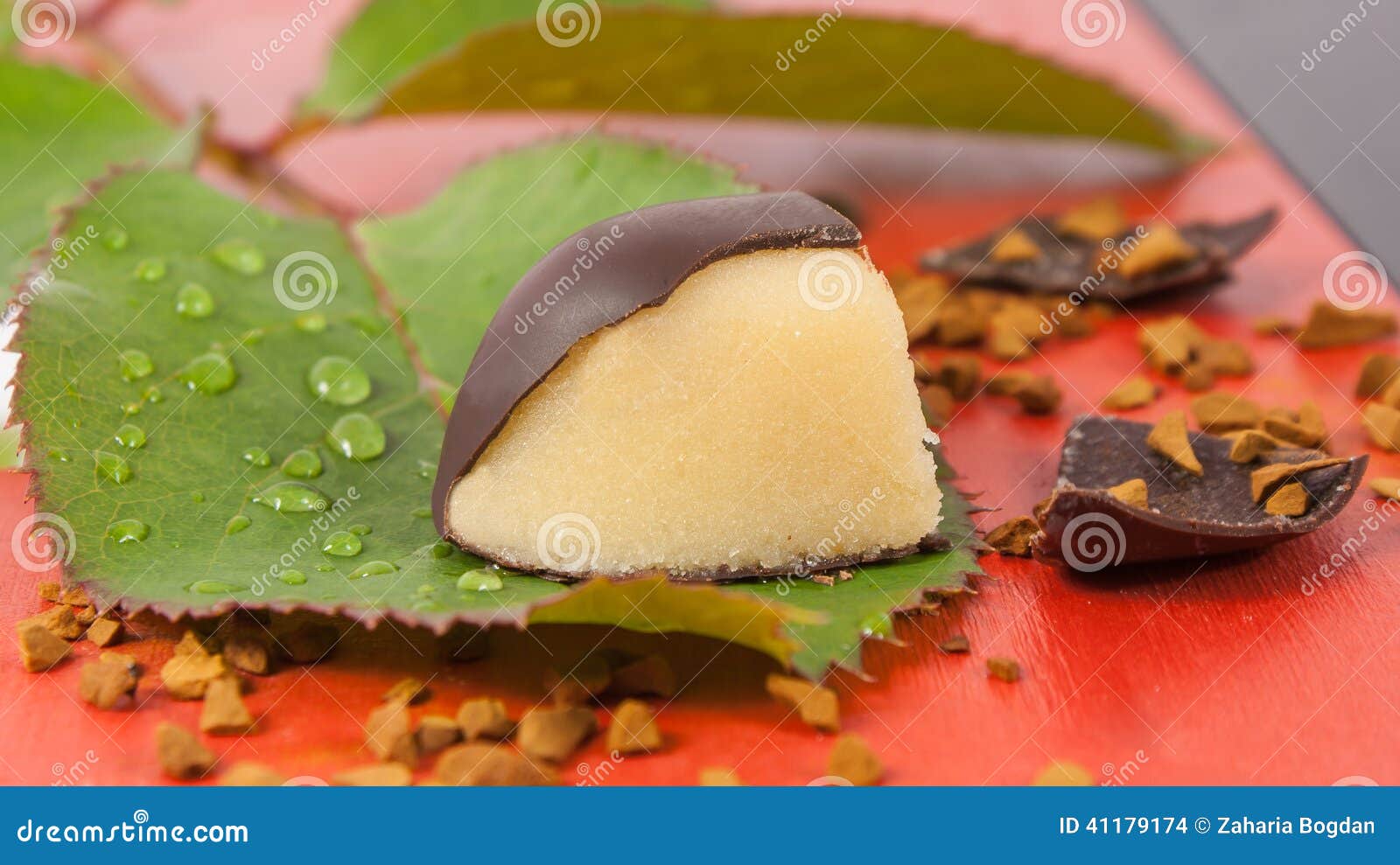 Marzipan Orange Chocolate Candy on a Green Leaf Stock Photo - Image of ...