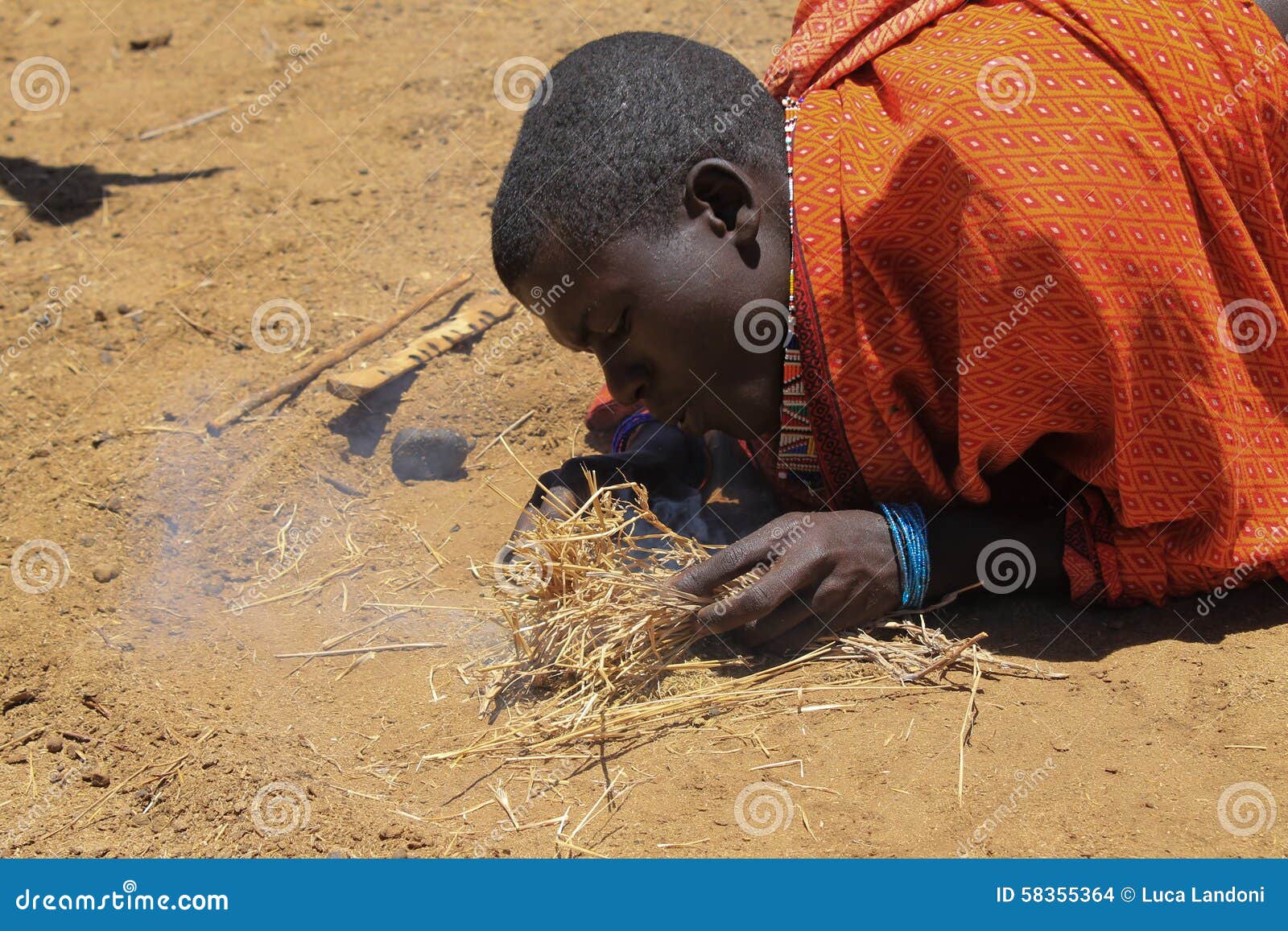 Masai and the fire editorial stock image. Image of masai - 58355364