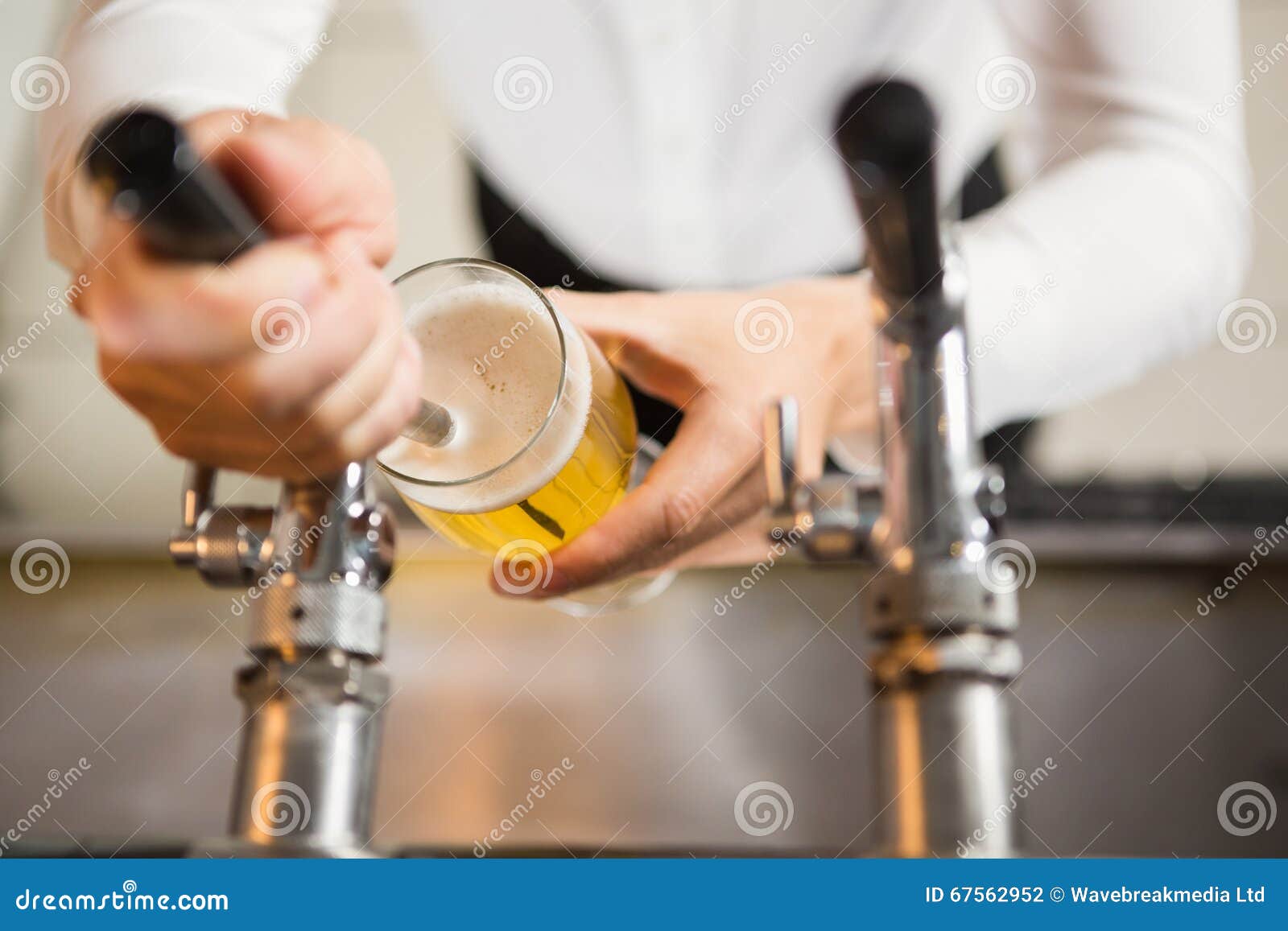 Masculine Hands Pouring a Pint Stock Photo - Image of staff, bartender ...