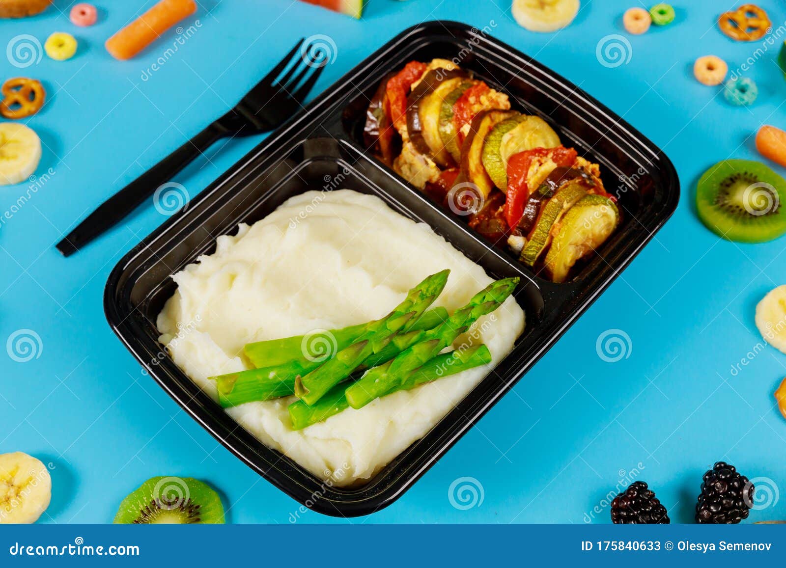 Mashed Potatoes with Asparagus and Ratatouille in Food Container Stock ...