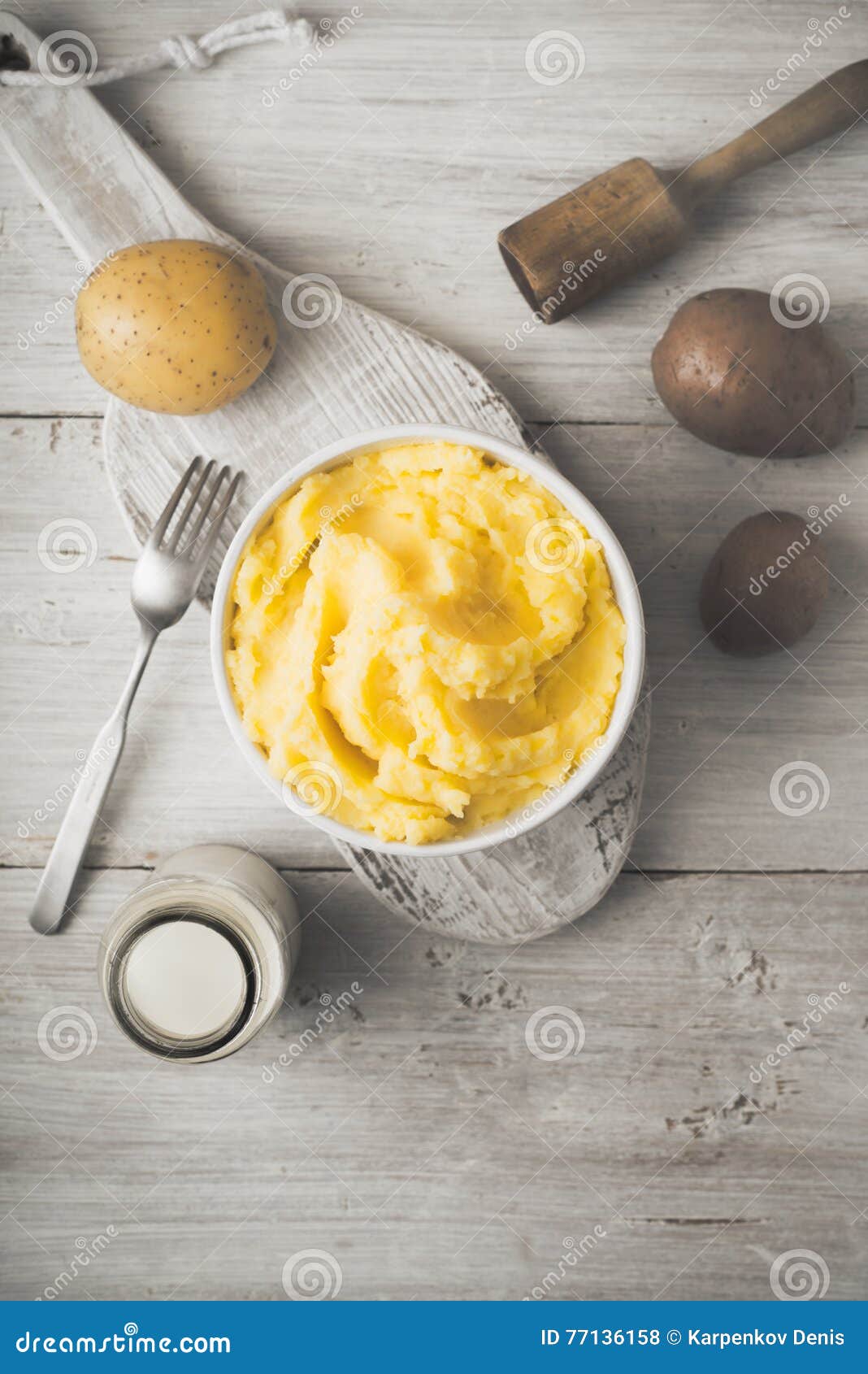 Mashed Potatoes in the Bowl on the White Wooden Table with Fork and ...