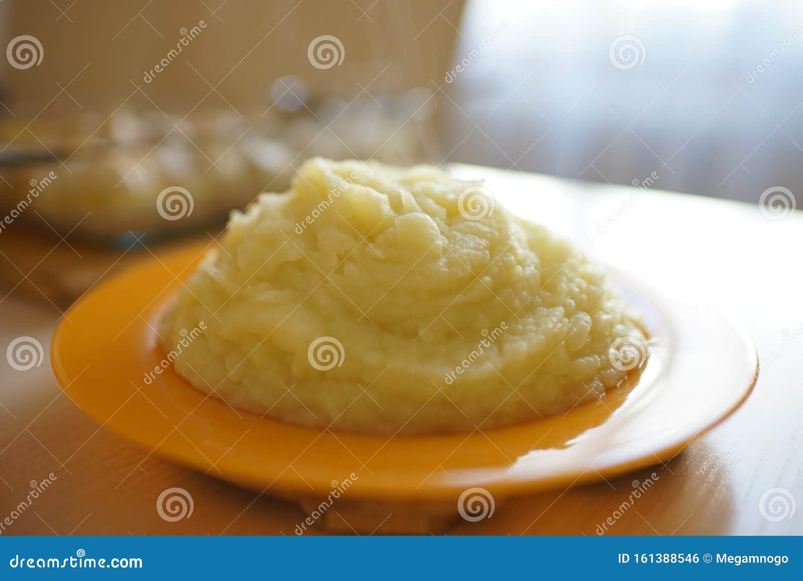 Mashed Potatoes in a Plate on the Table Stock Photo - Image of ...