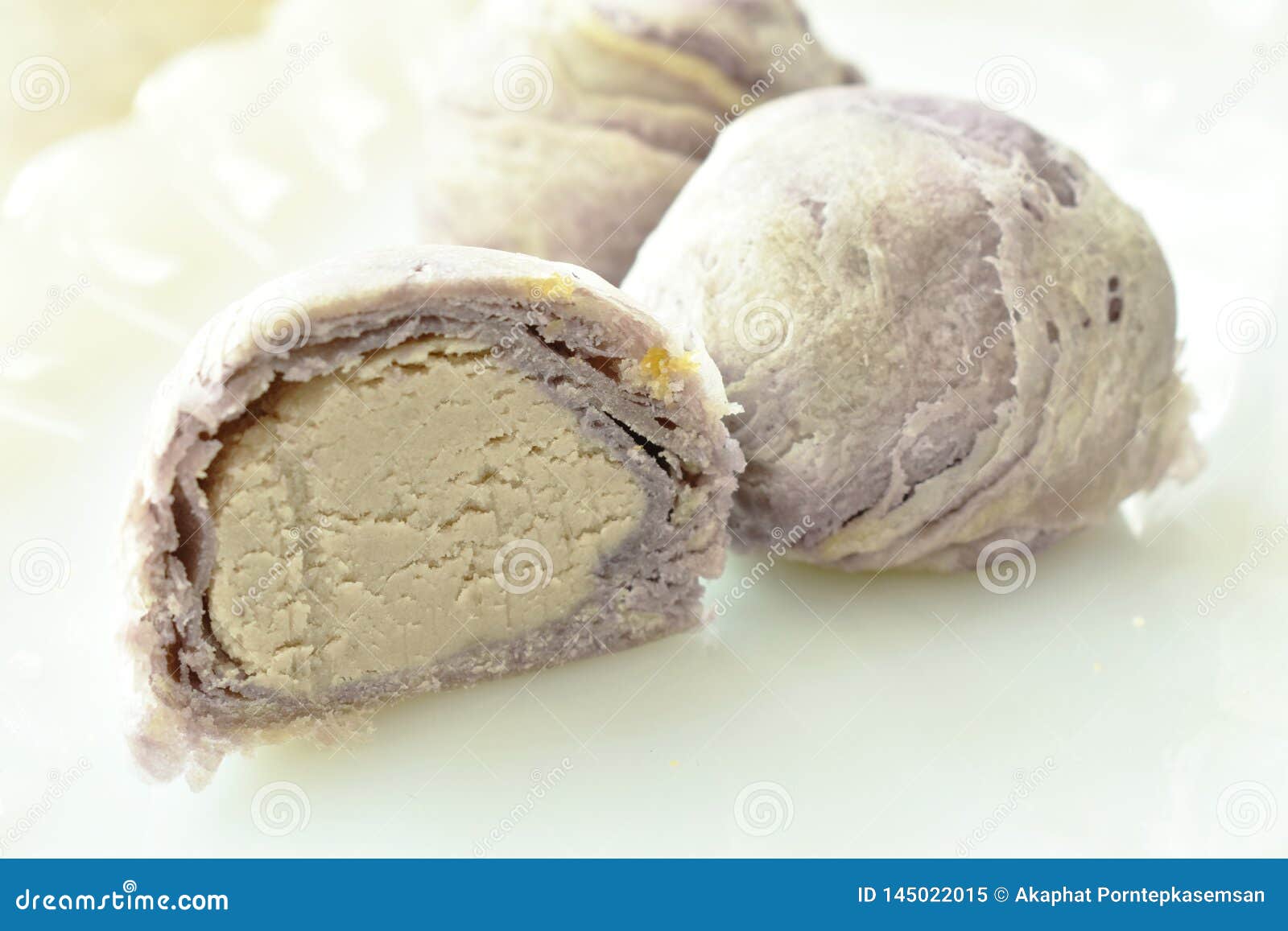 Mashed Taro Stuffed Cake Half Cut on Plate Stock Image - Image of ...