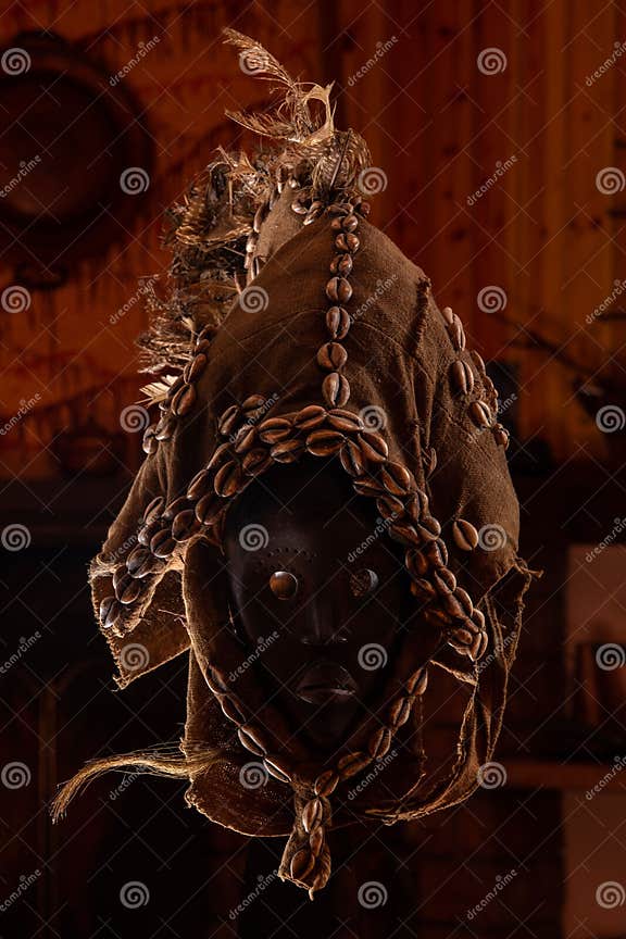 Mask with Cowrie Shells stock image. Image of carved - 177179755