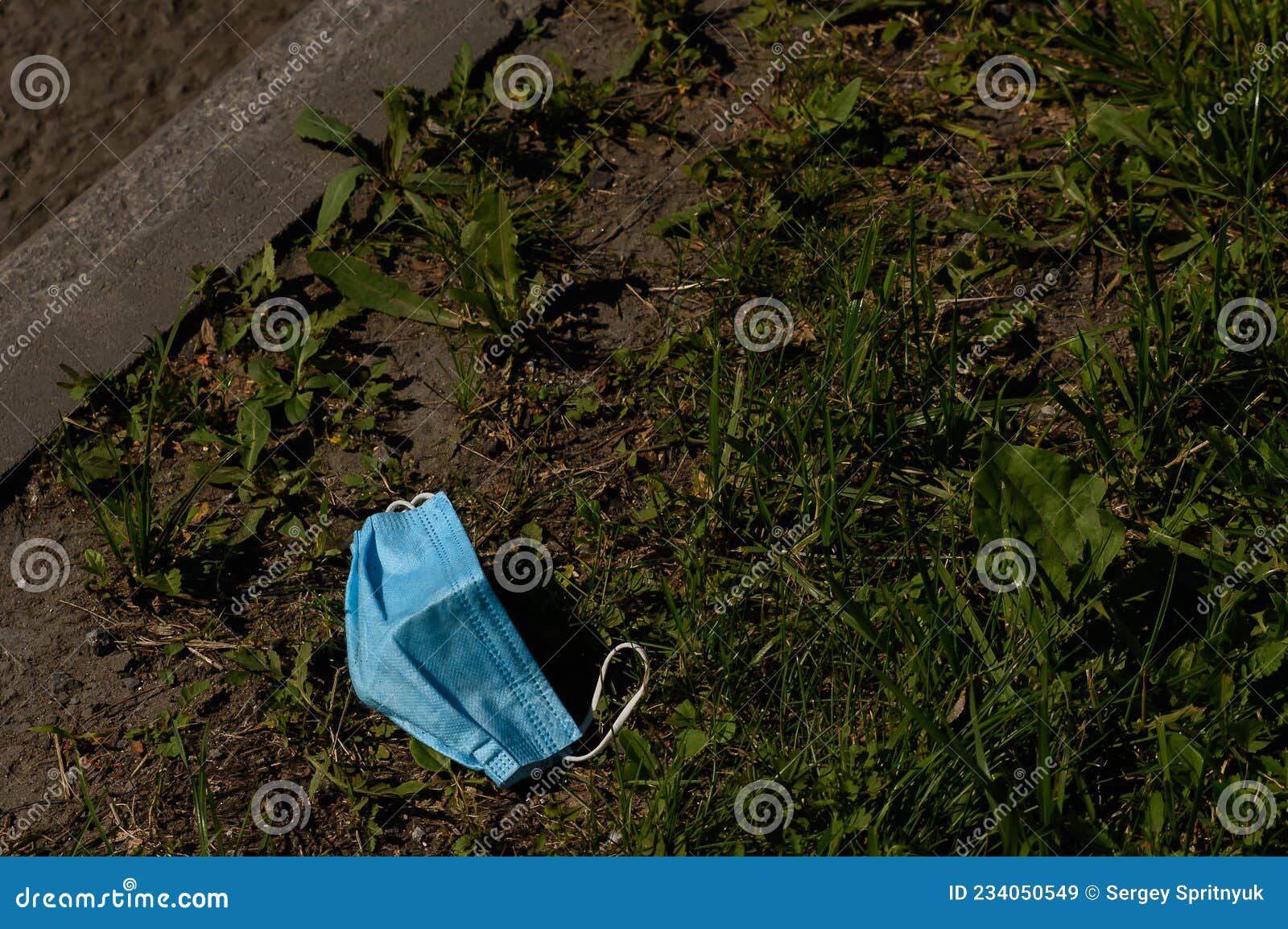 Mask on the Ground. Protective Mask on the Ground. Mask in the Grass ...
