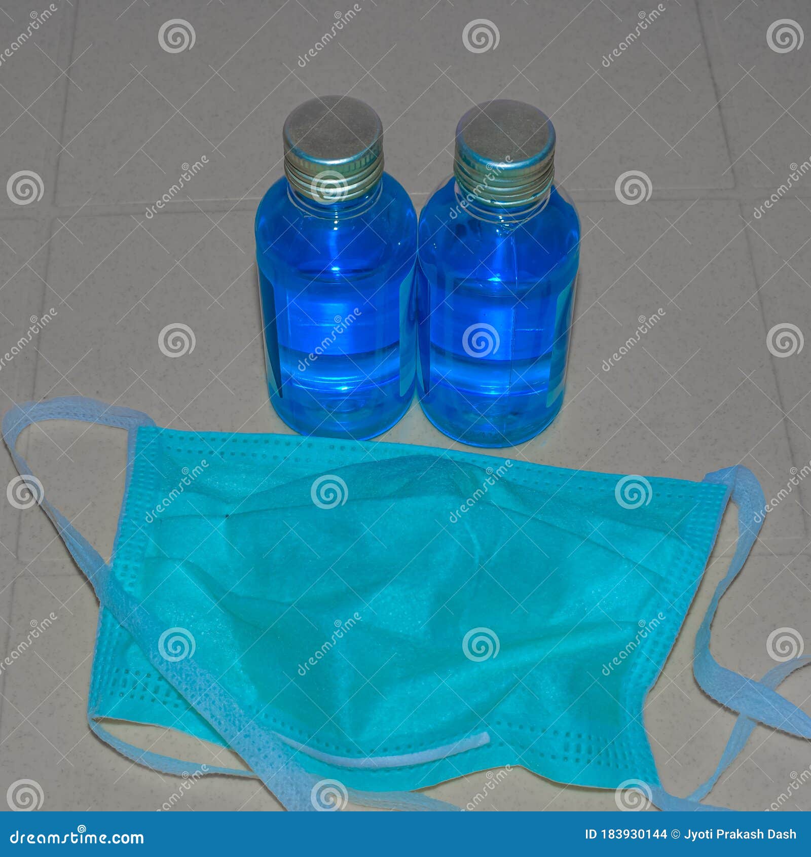 Mask & Sanitizer on the Table. Stock Photo - Image of mask, covid ...