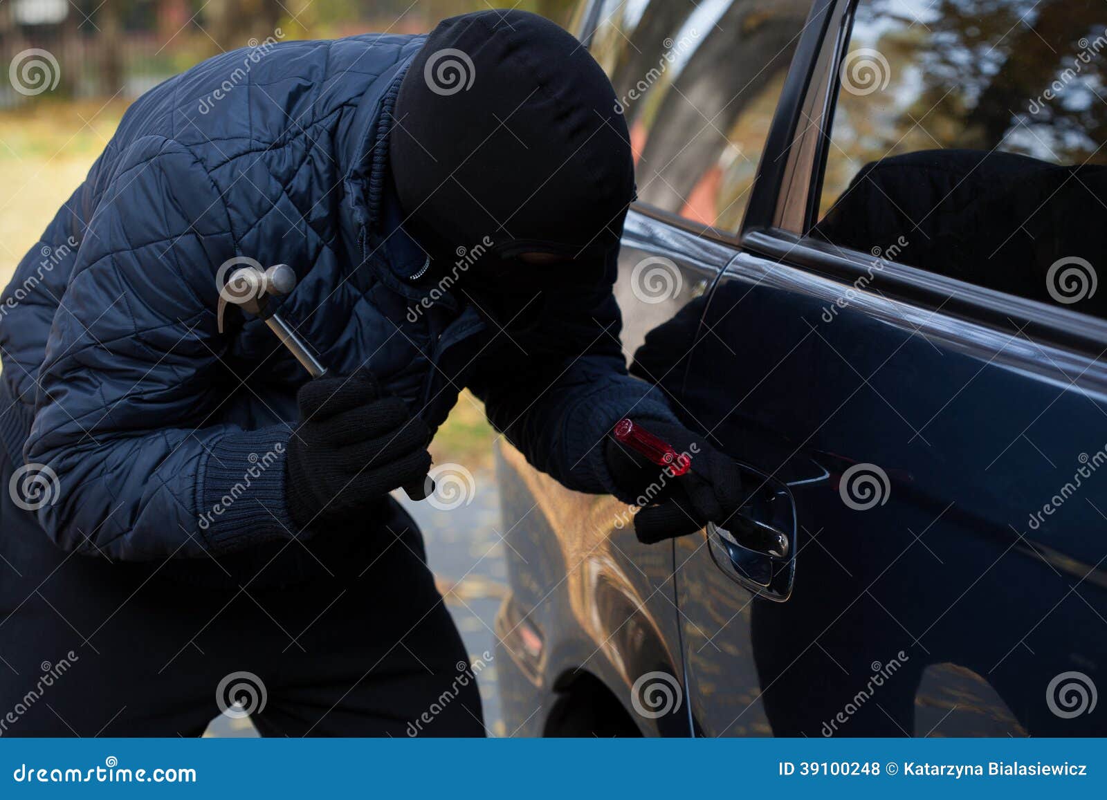 Masked Burglar Using Lock Picker To Open Locked Door Royalty-Free Stock ...