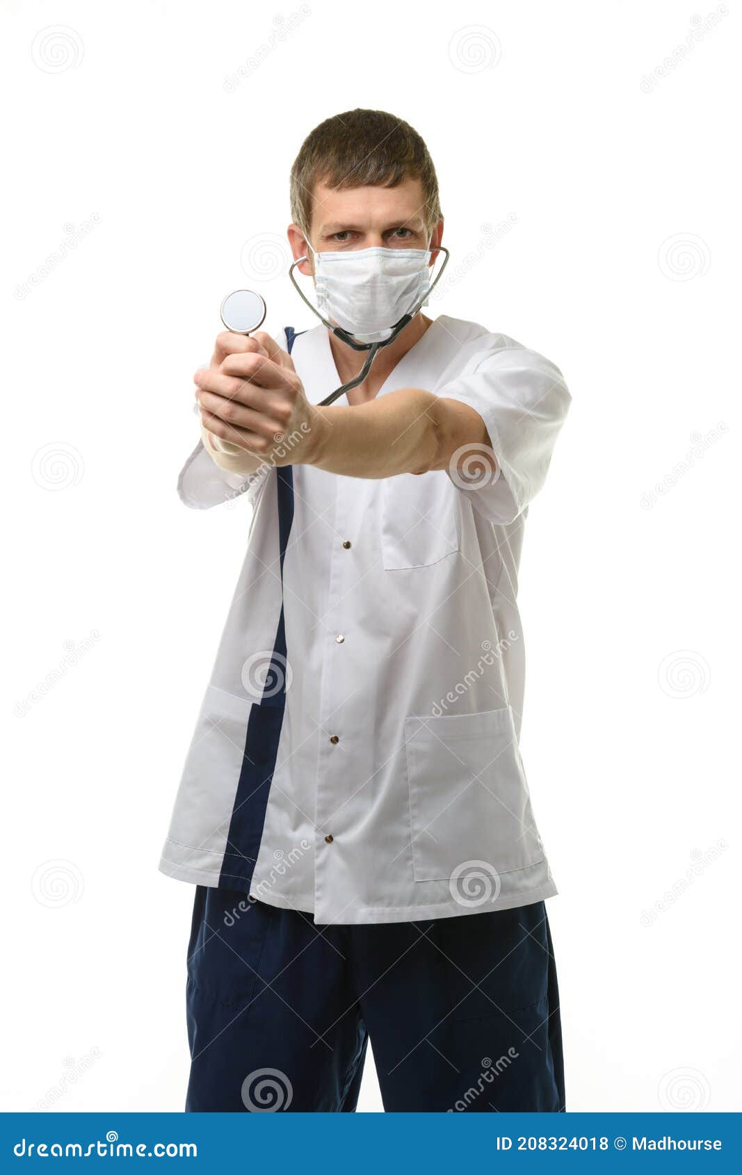 Masked Doctor Holding Head of Phonendoscope in Front of Him, Isolated ...