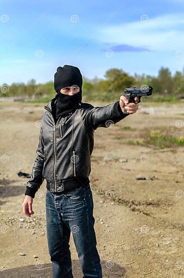 Masked gunman stock image. Image of assassin, danger - 24908505